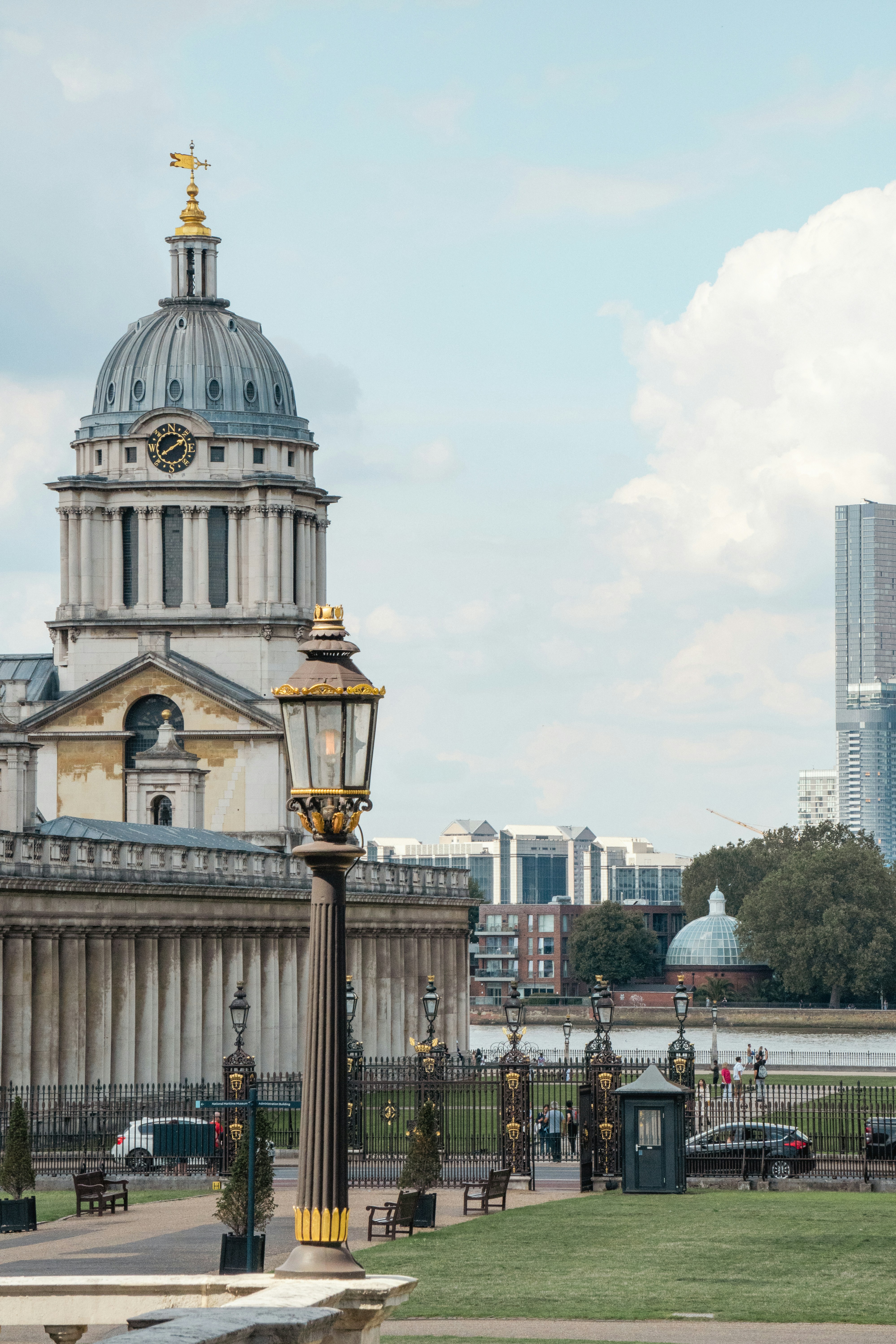 Greenwich Dome by the Thames: Lantern-Lined Promenade and River Skyline