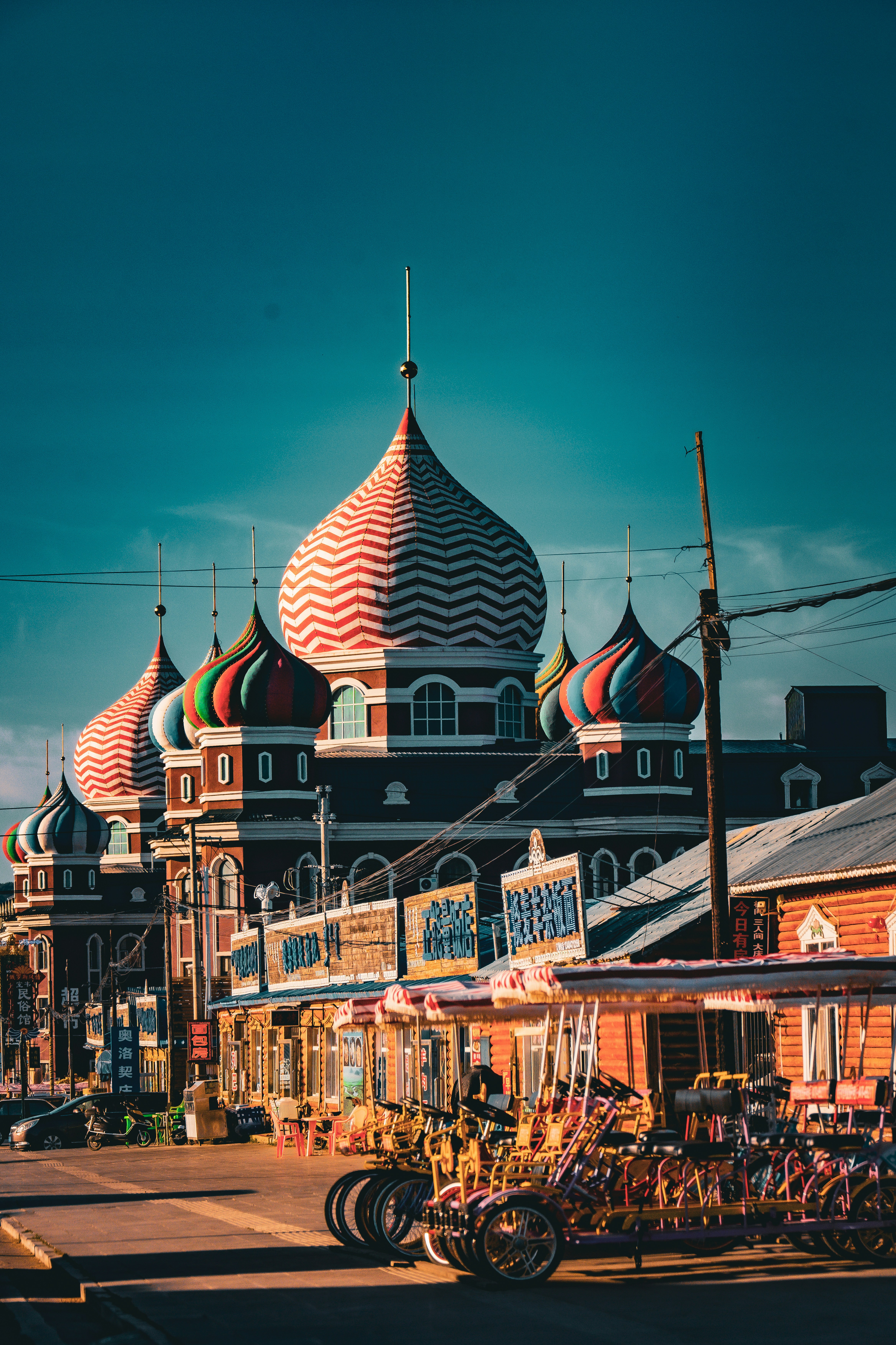Chevron-Domed Cathedral Looms Over a Lively Market Street