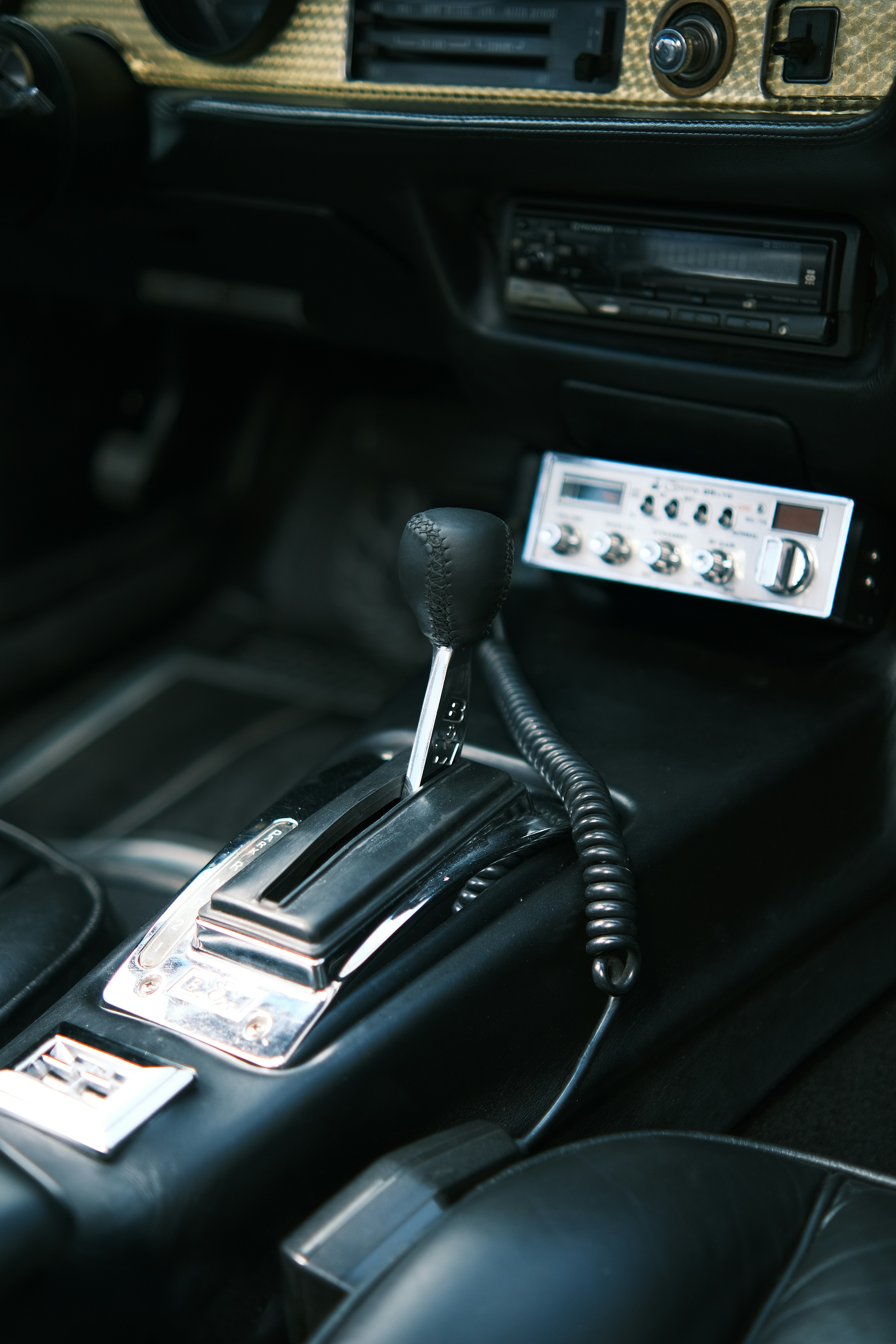Shifter in Focus: A Classic Car Interior's Quiet Centerpiece