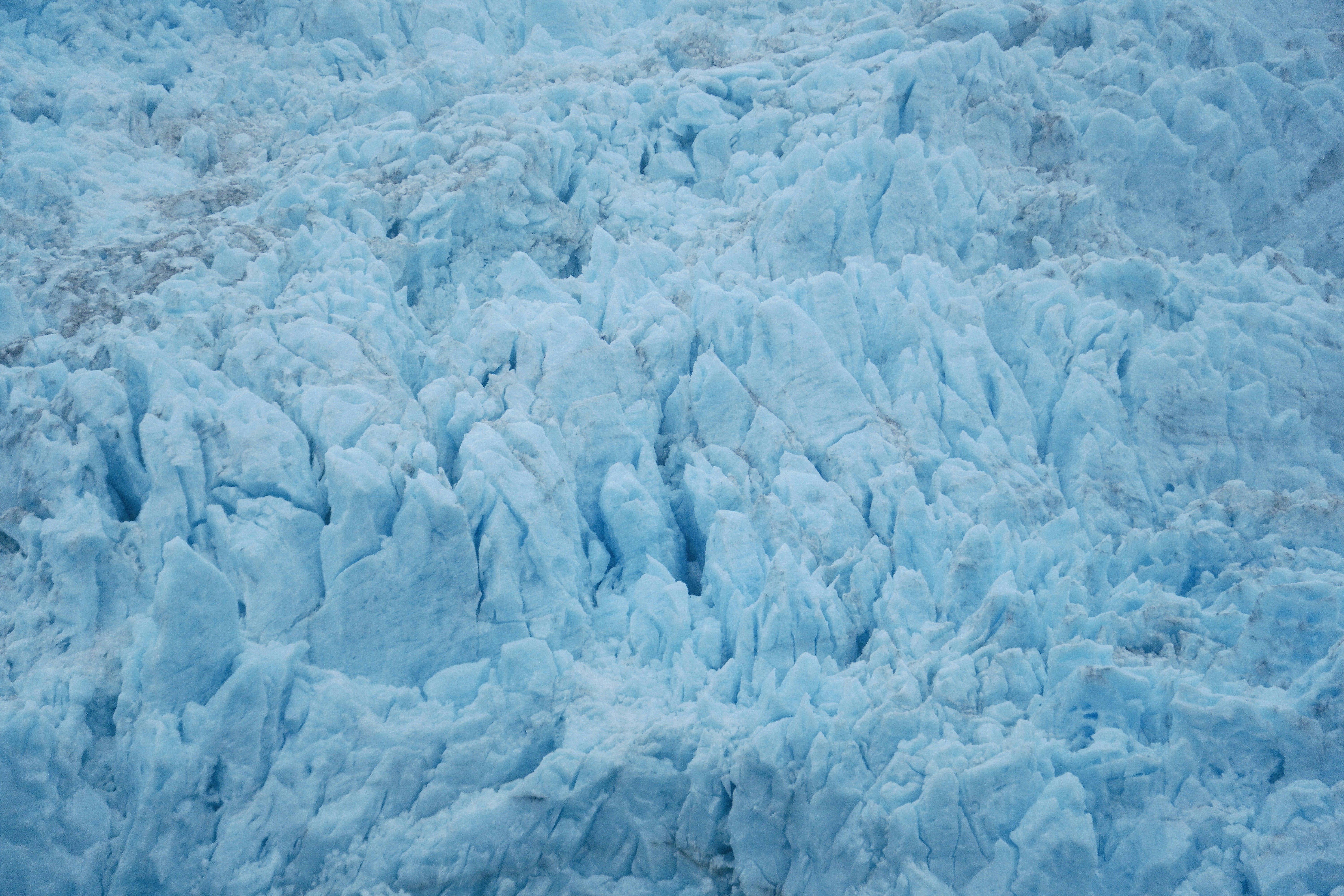 A very large glacier with lots of blue ice photo – Free Glacier Image ...