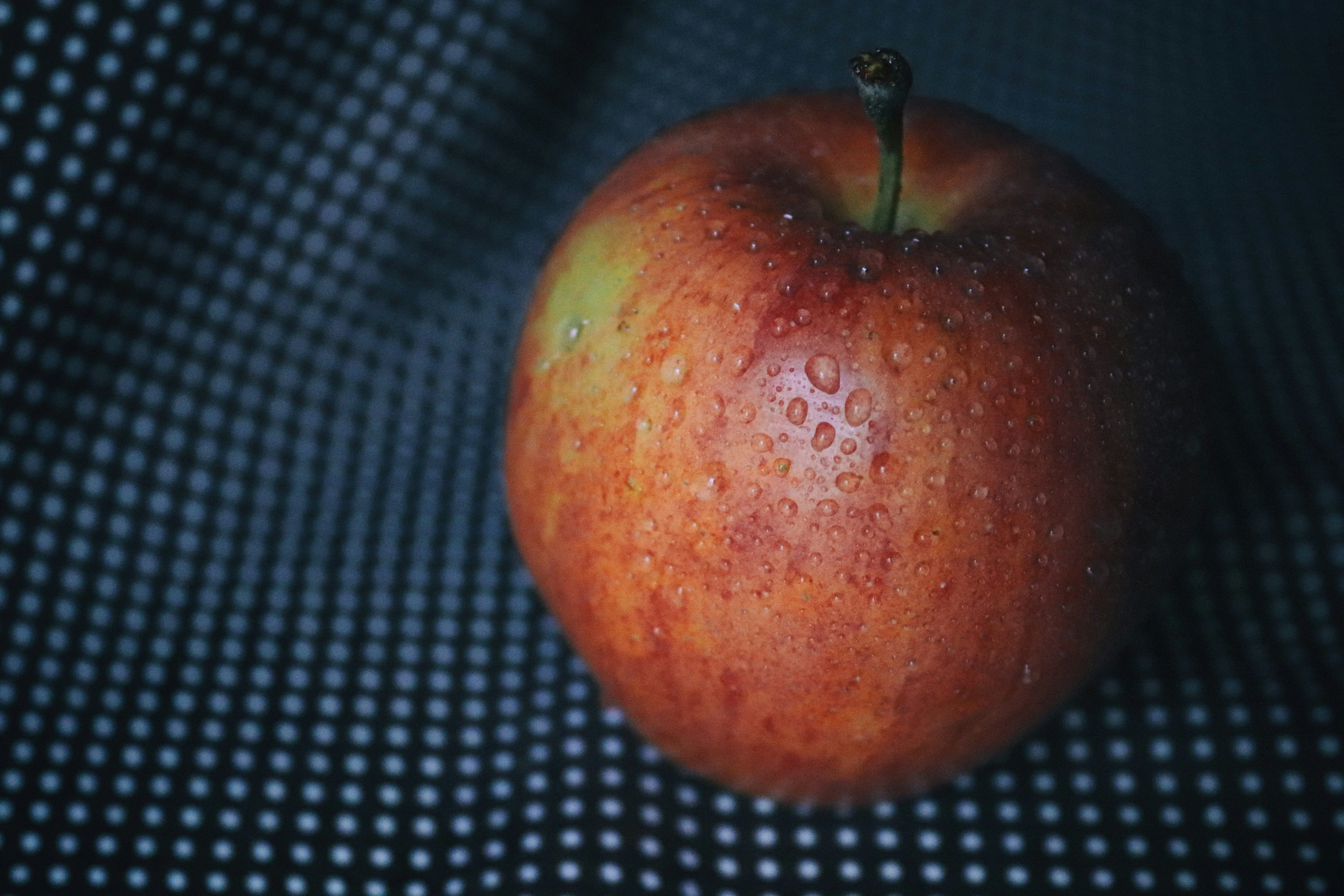 A close up of an apple on a cloth photo – Free Free images Image on ...