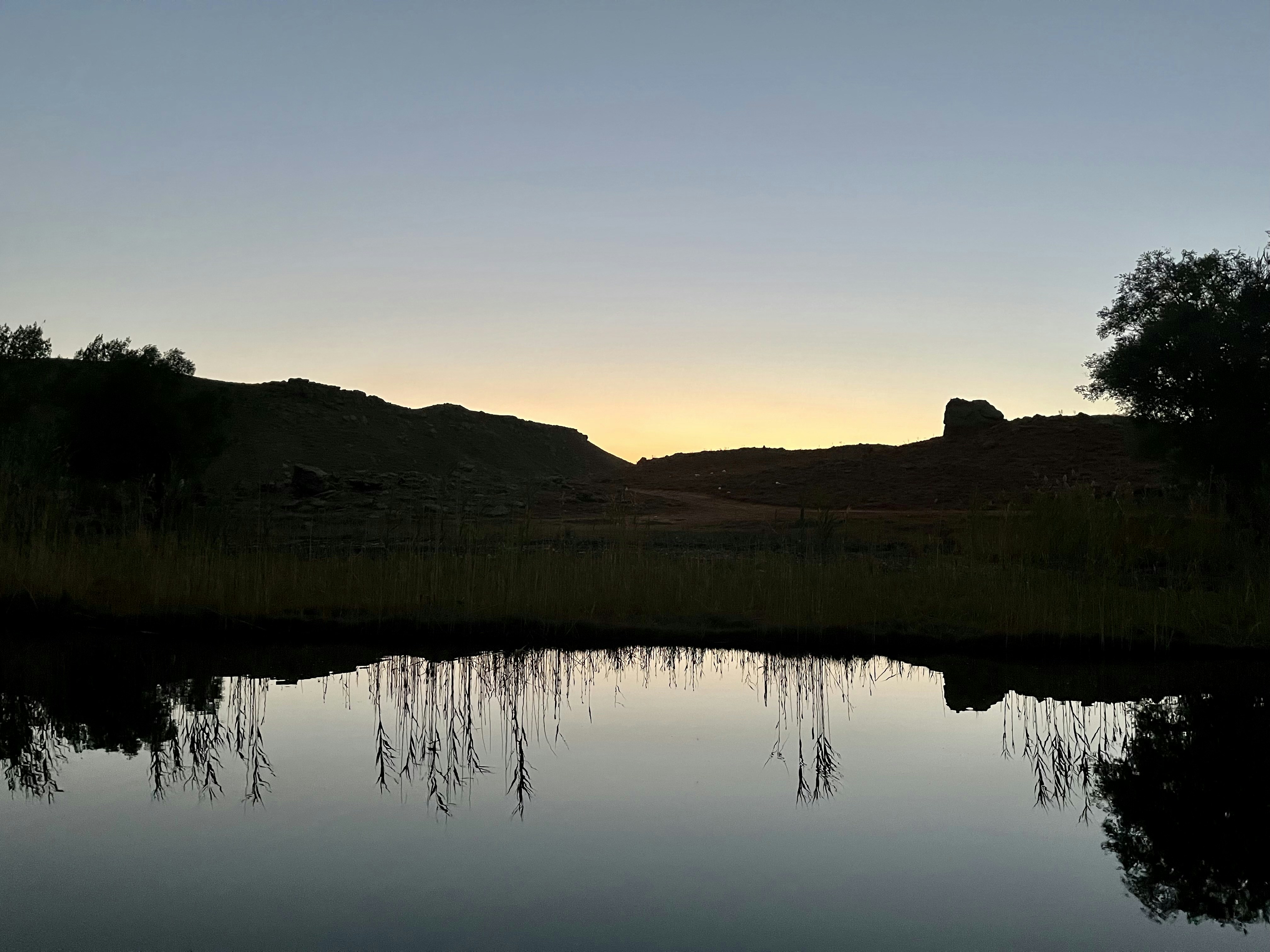 A body of water with a mountain in the background photo – Free Takab ...