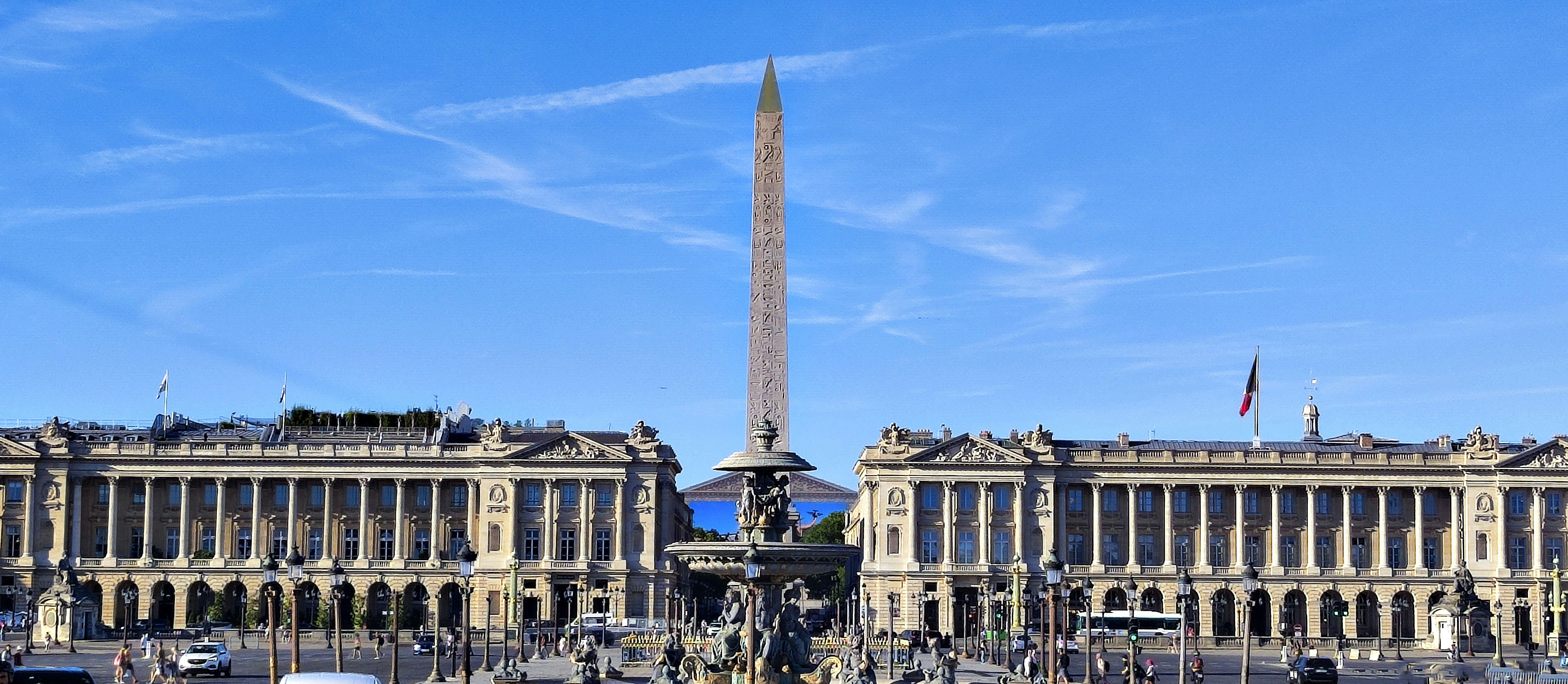 The Obelisk's Quiet Parade: Sunlit Neoclassicism in a Parisian Square