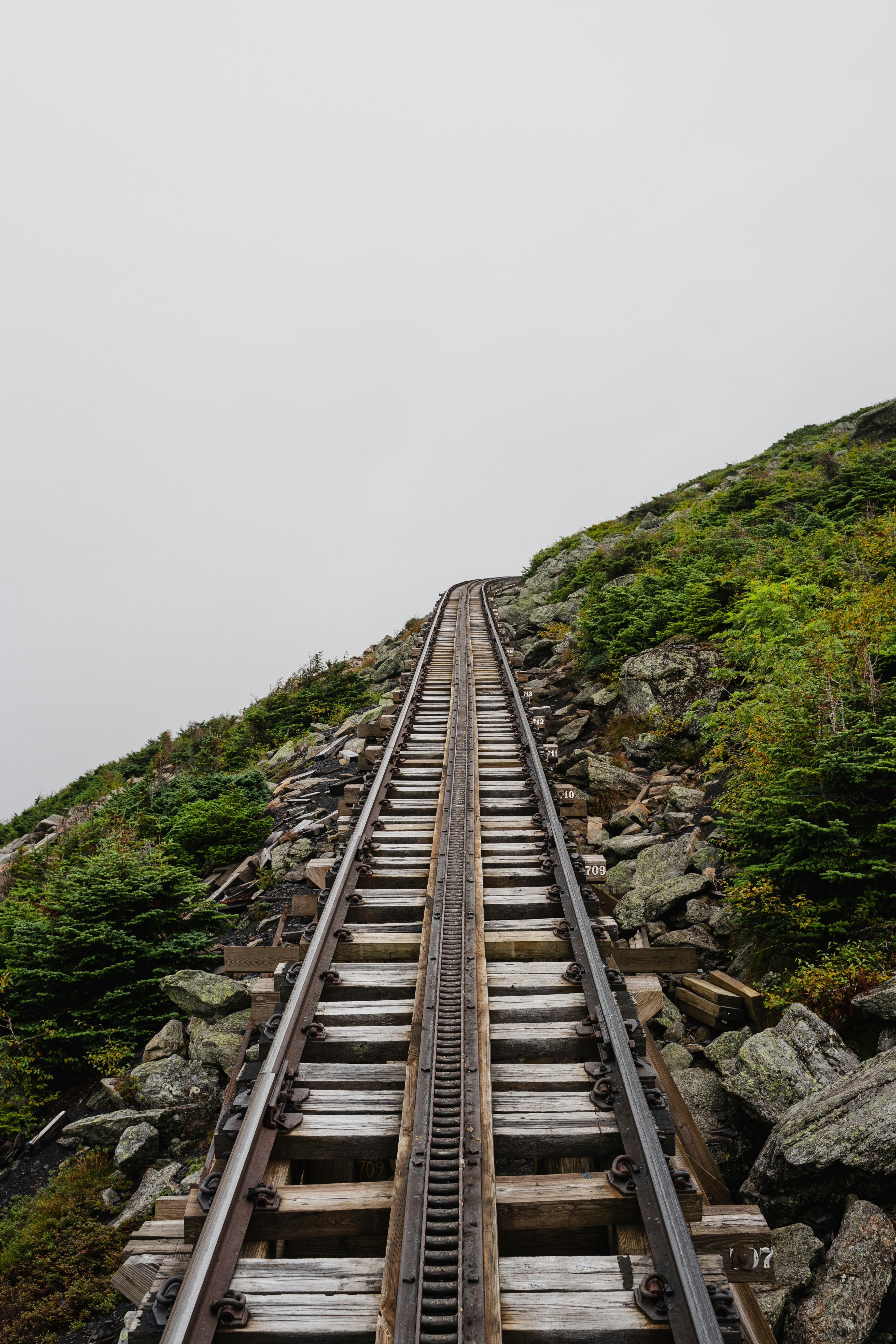 A train track going up the side of a mountain photo – Free The mount ...