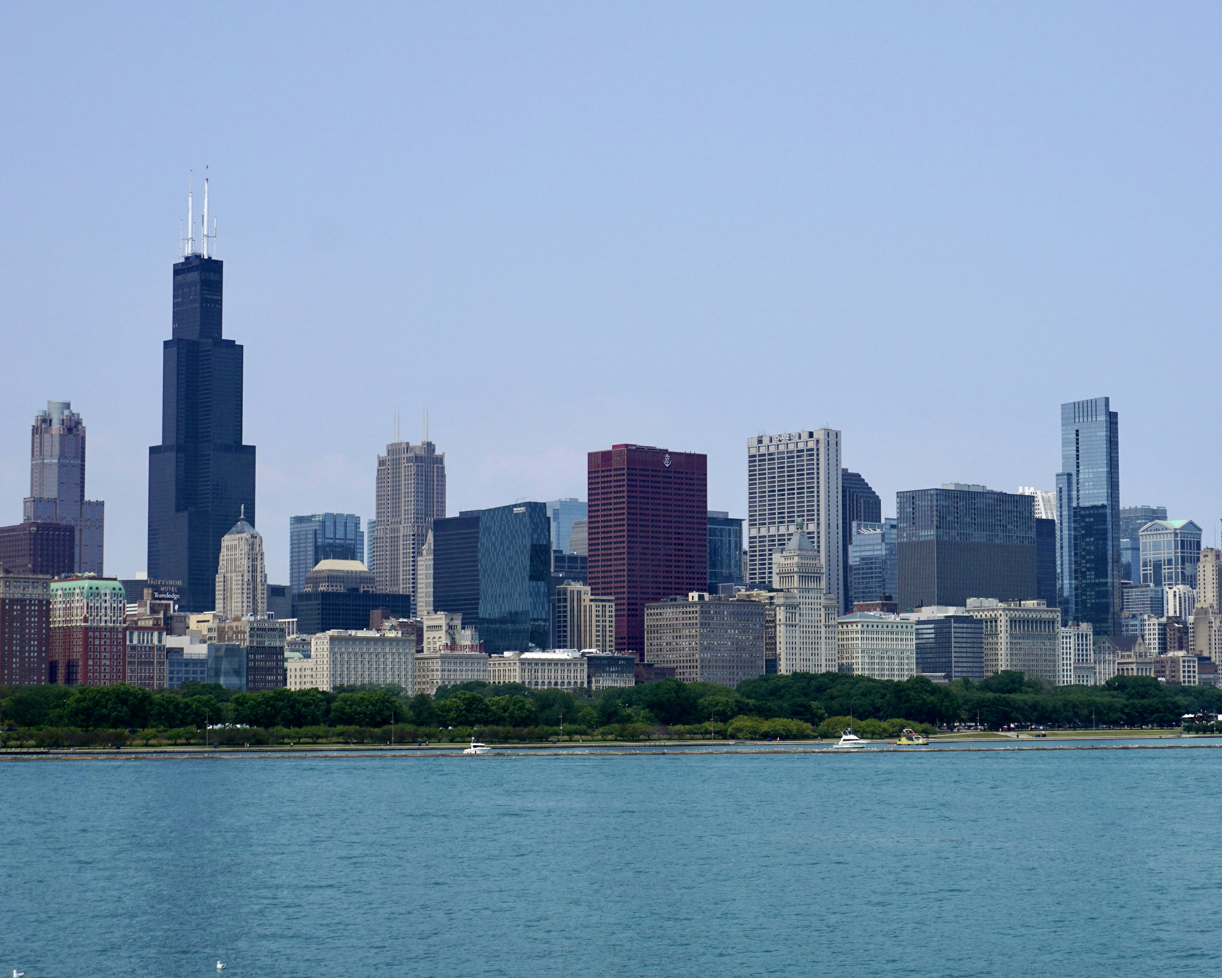 A view of a city from across the water photo – Free Chicago Image on ...