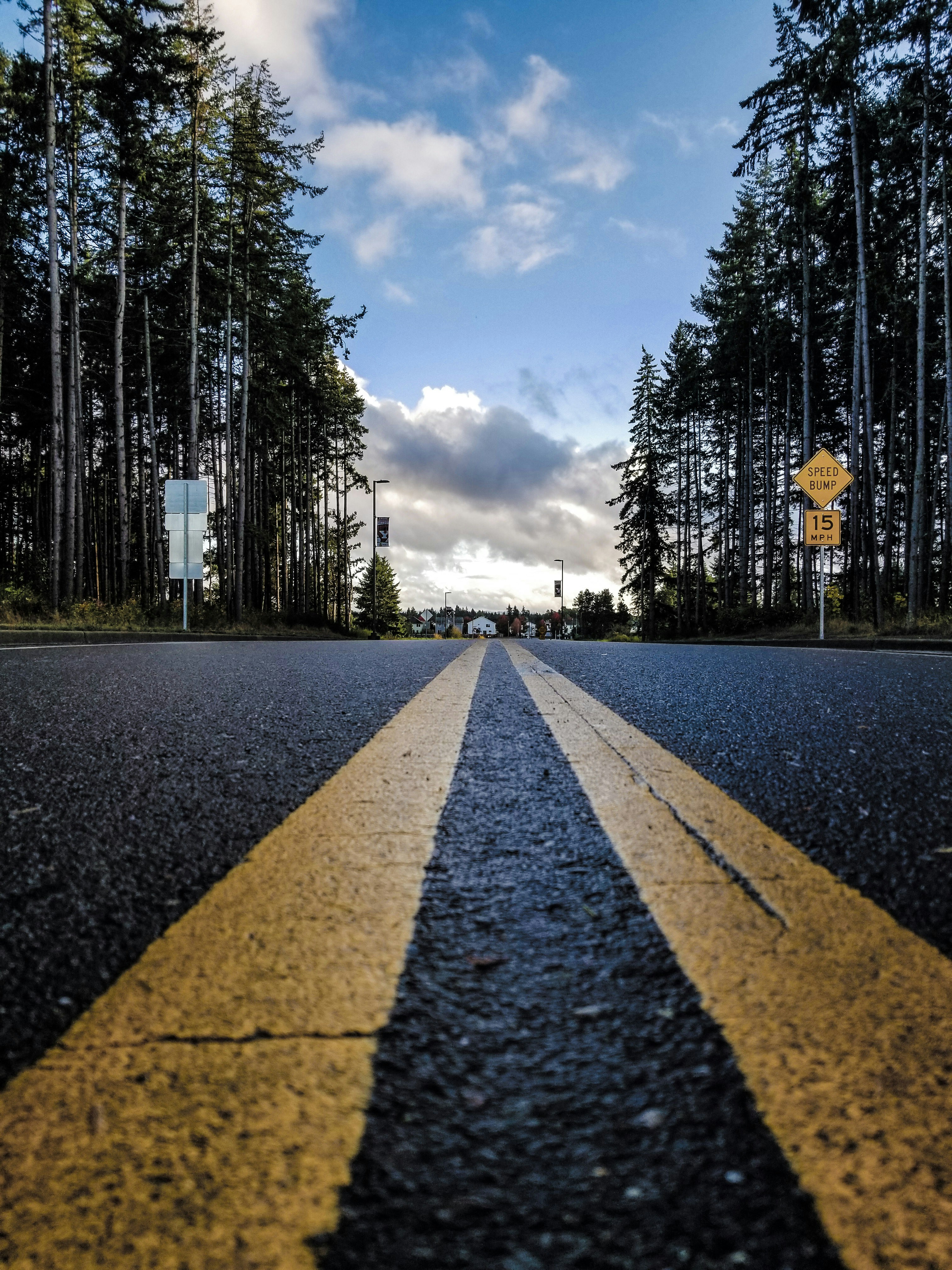 A road with a yellow line on the side of it photo – Free Yelm Image on ...
