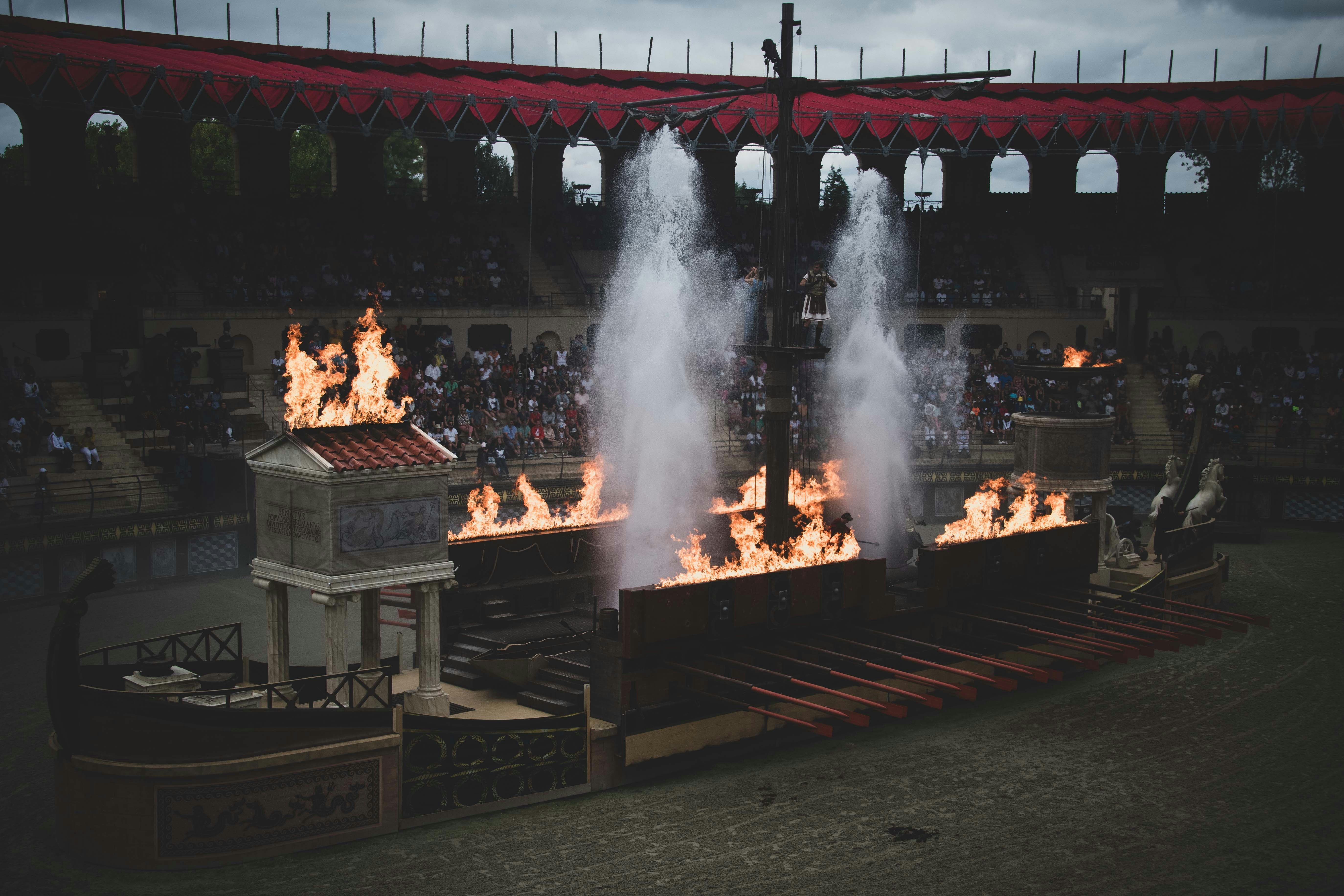 A fire pit with a lot of fire coming out of it photo – Free Fire Image ...