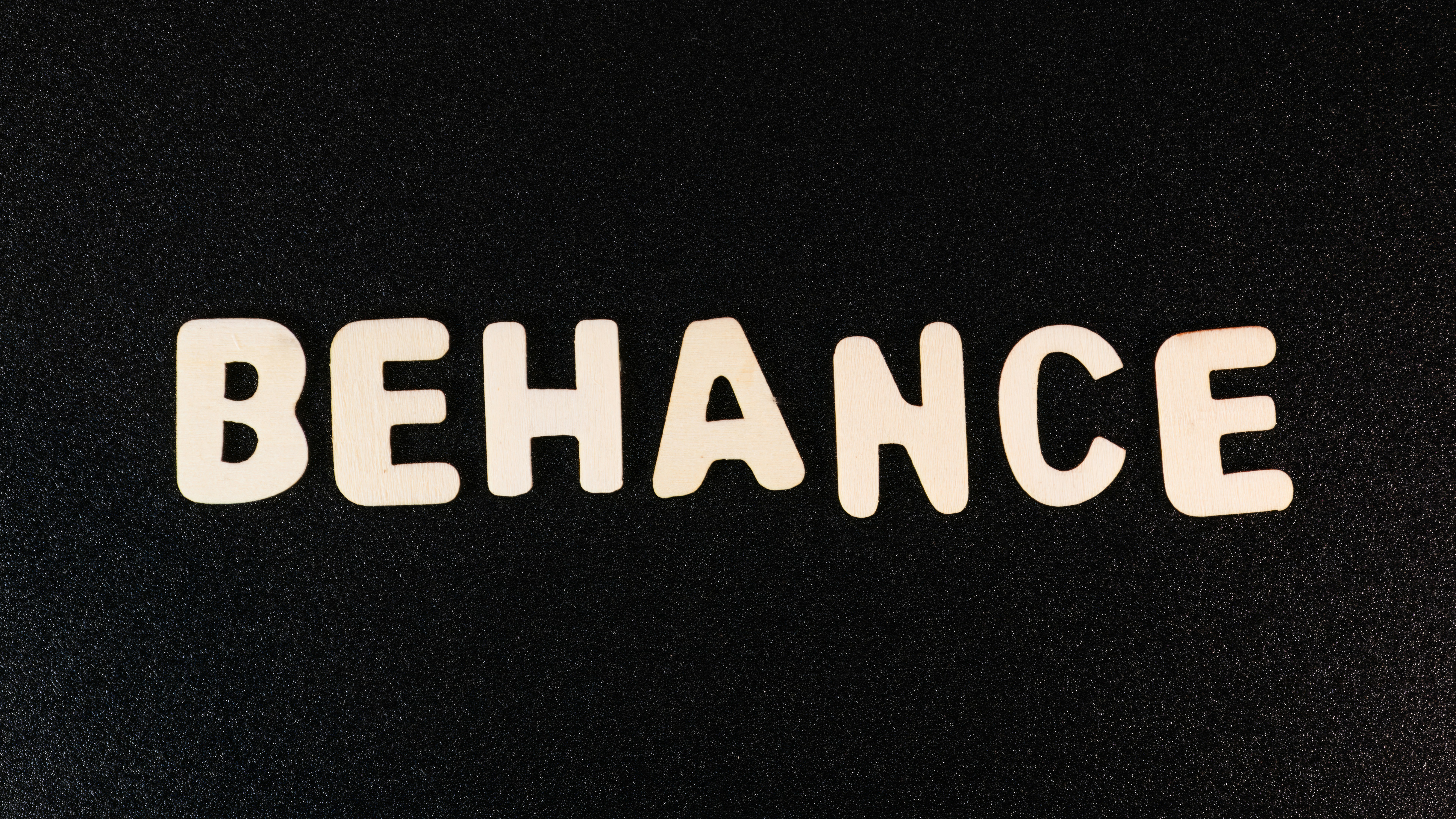 The word behance written in white type on a black background photo – Free Scrabble Image on Unsplash