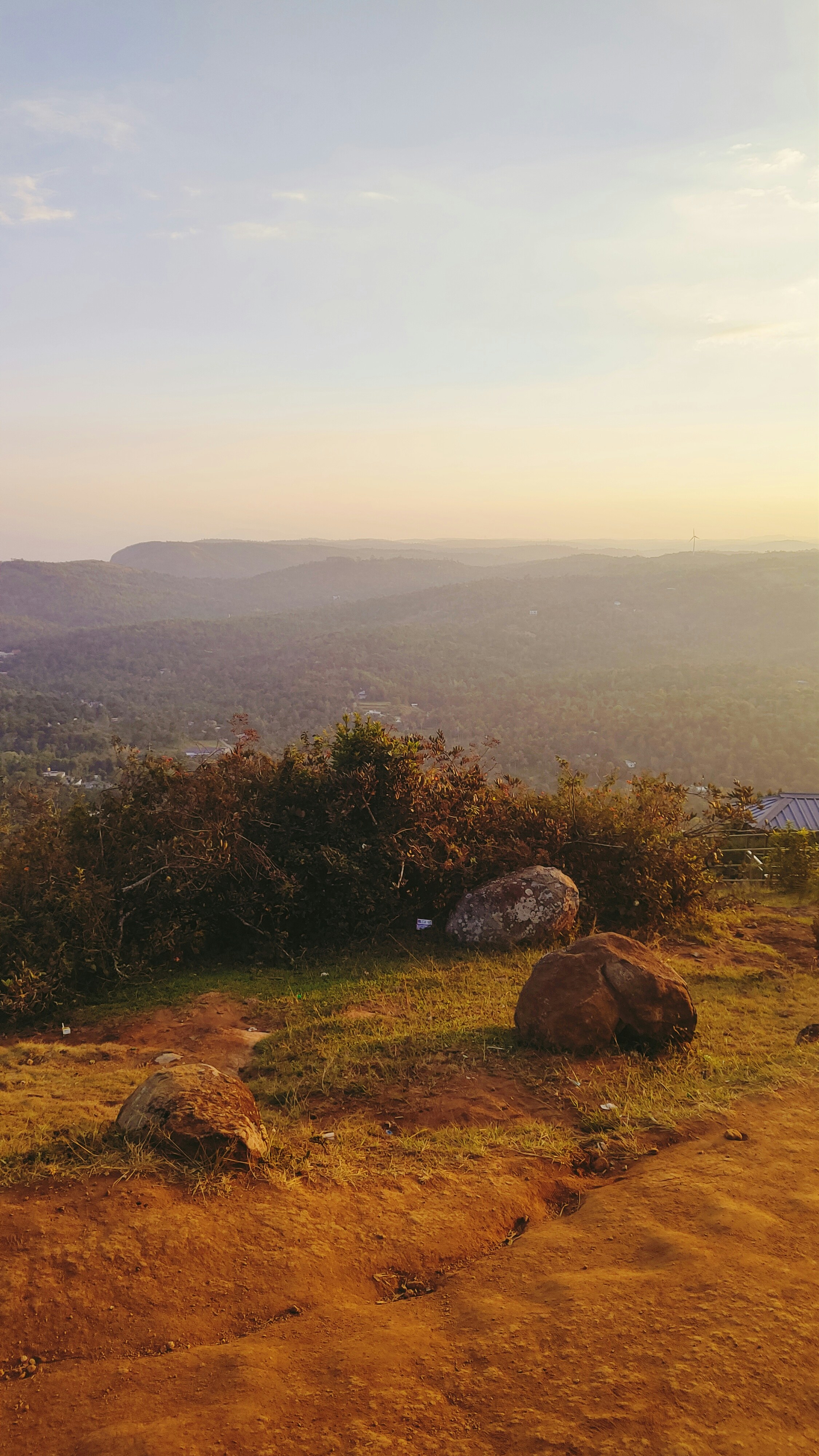 A view of a hill with rocks and bushes photo – Free Wilderness Image on ...
