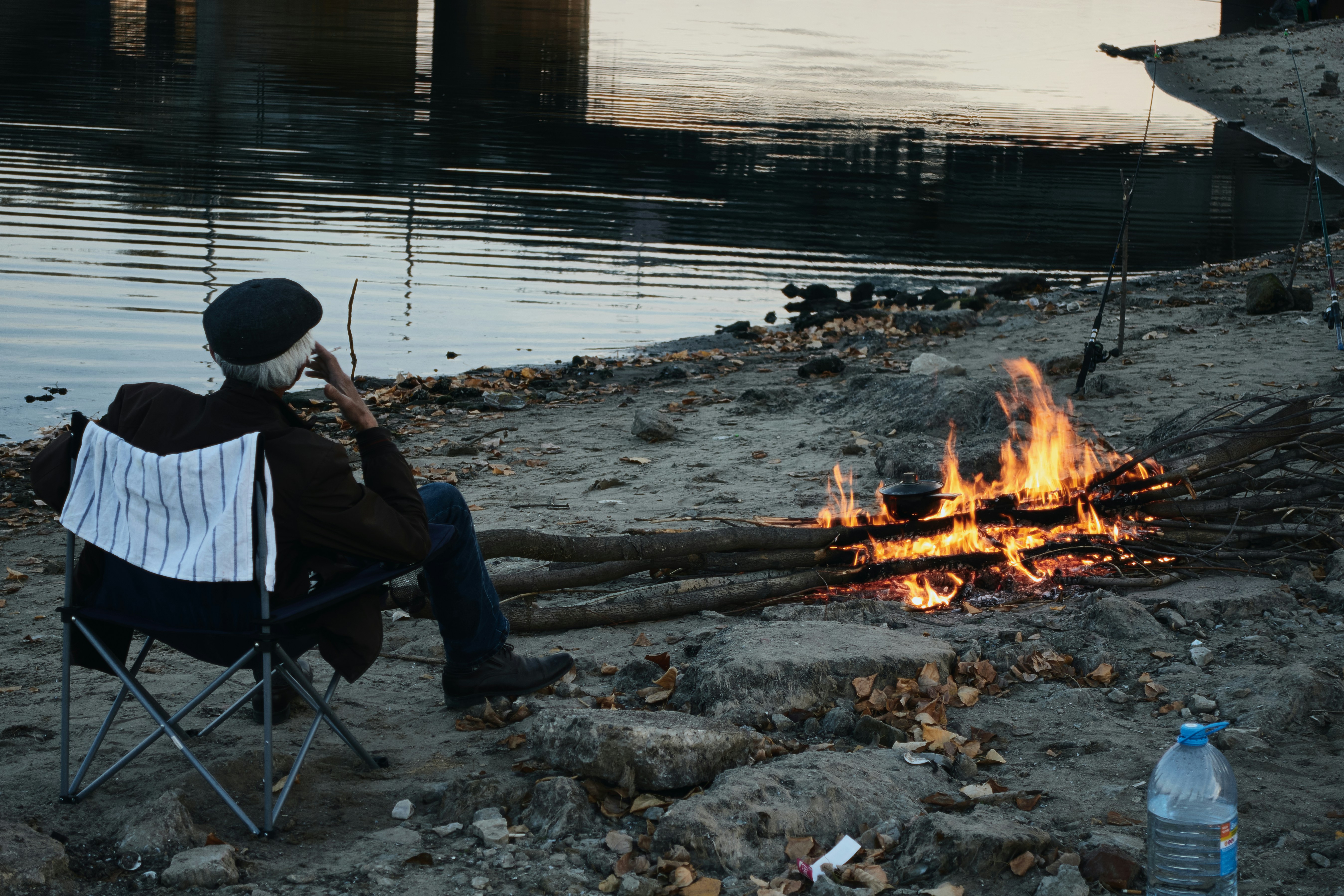 Evening by the Ember: A Quiet Riverbank Conversation