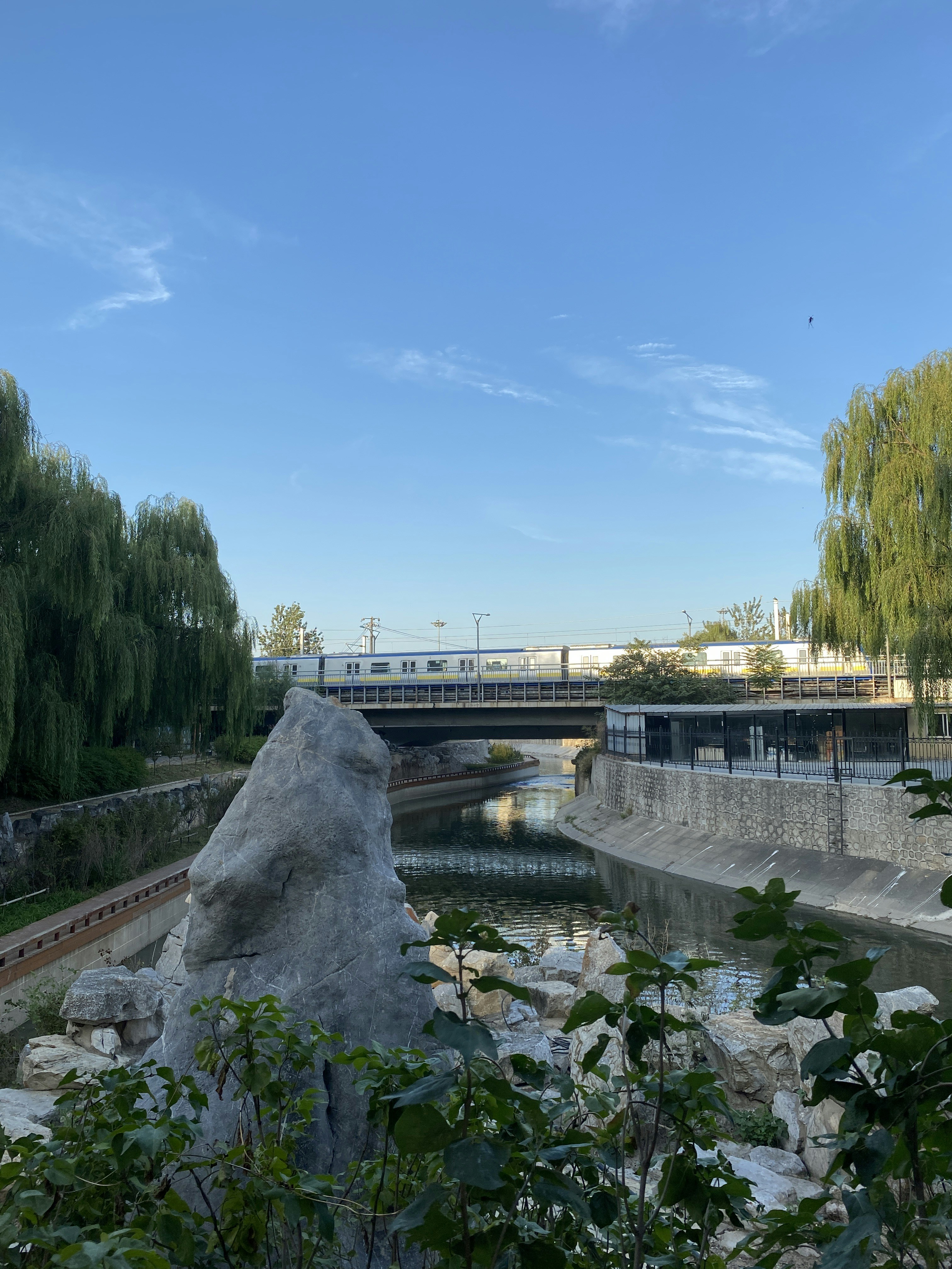 Stone Sentinel Over a Quiet Canal