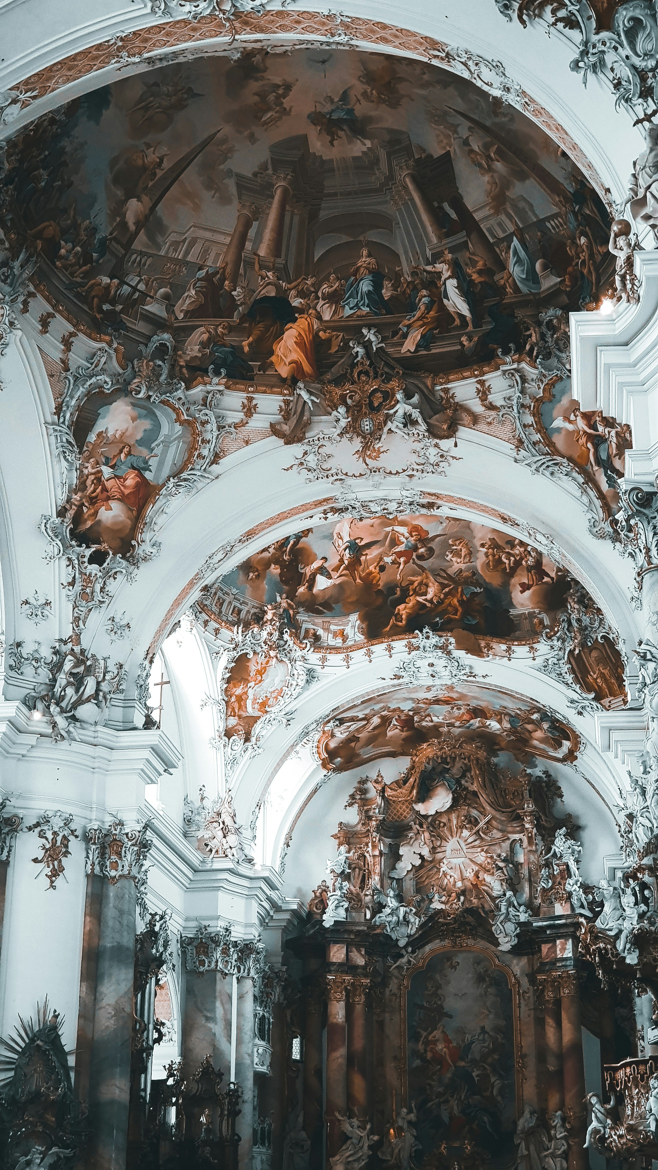 Celestial Frescoes Among Gilded Arches: Inside a Baroque Cathedral