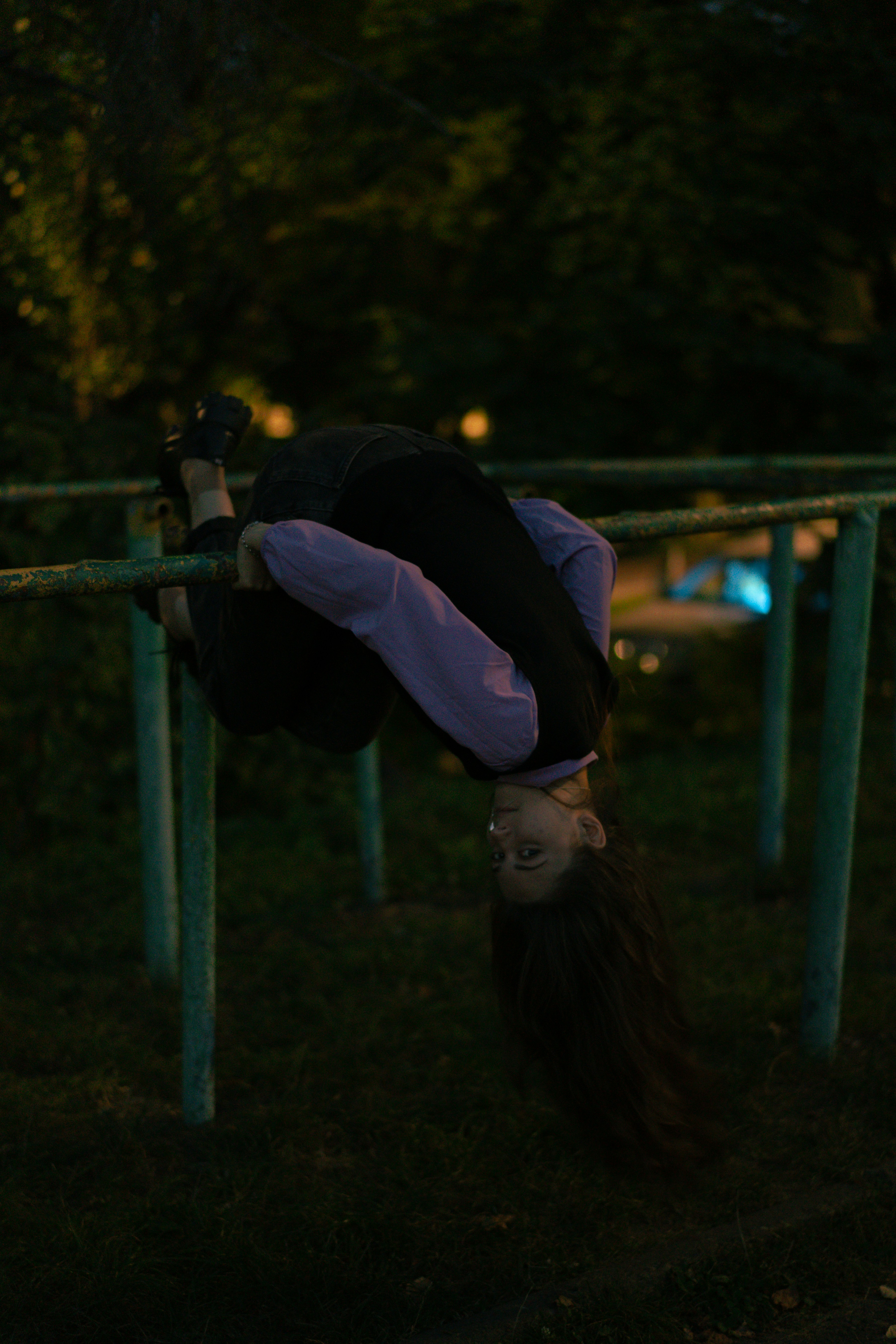 A person hanging upside down on a pole photo – Free Ukraine Image on ...