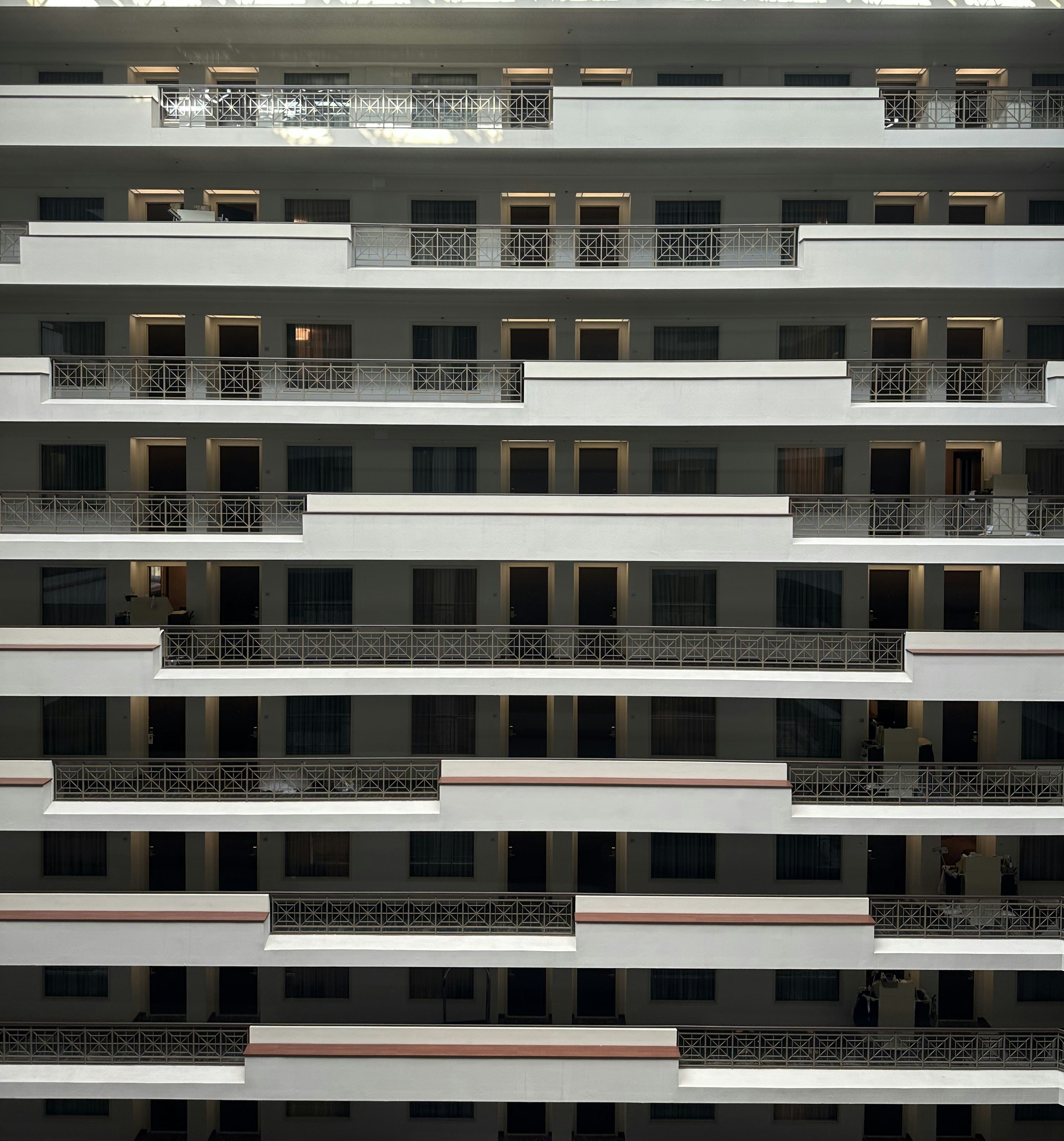 A tall building with balconies and balconies on each floor photo – Free ...