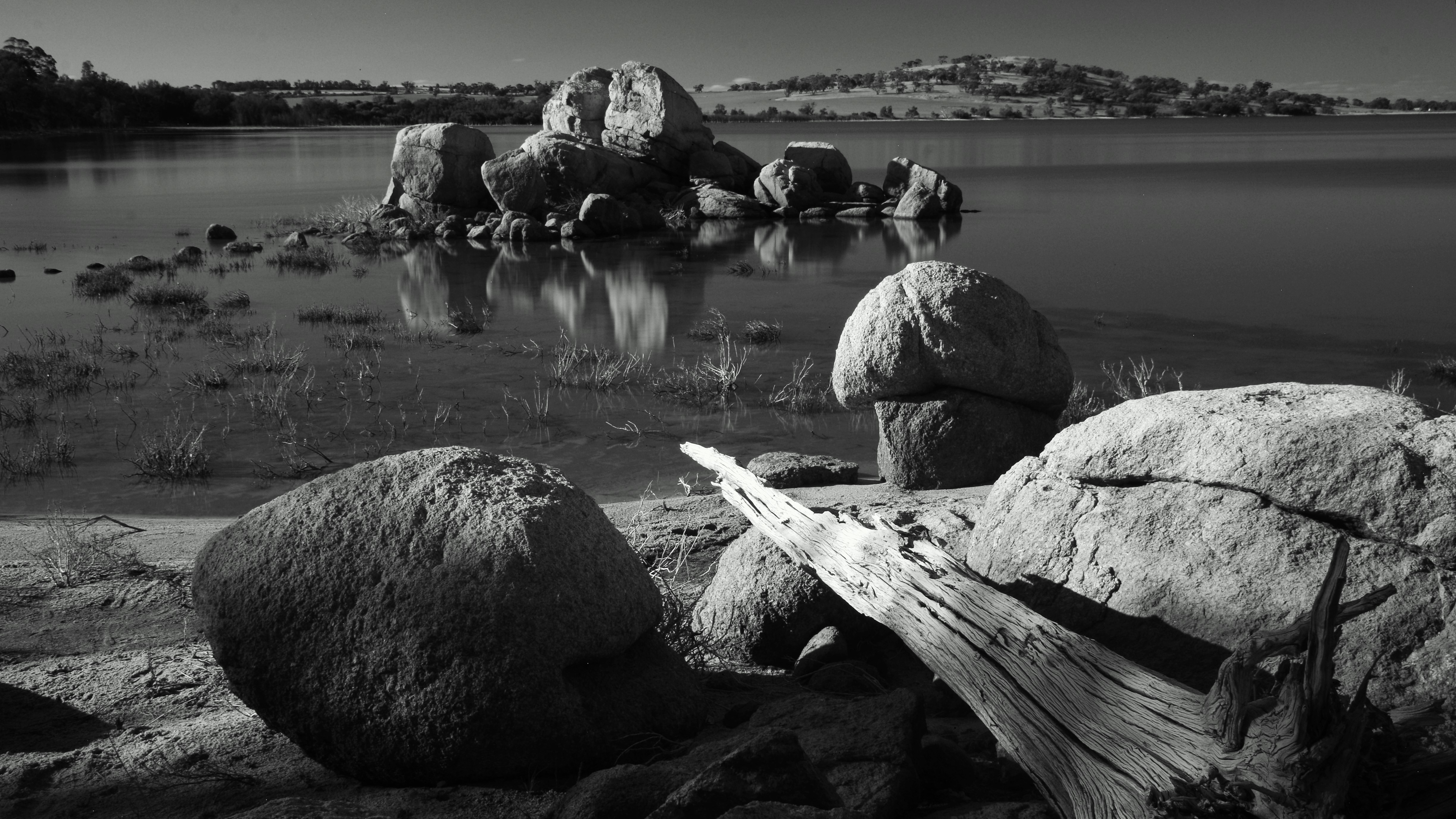 A black and white photo of rocks and water photo – Free Norring lake ...