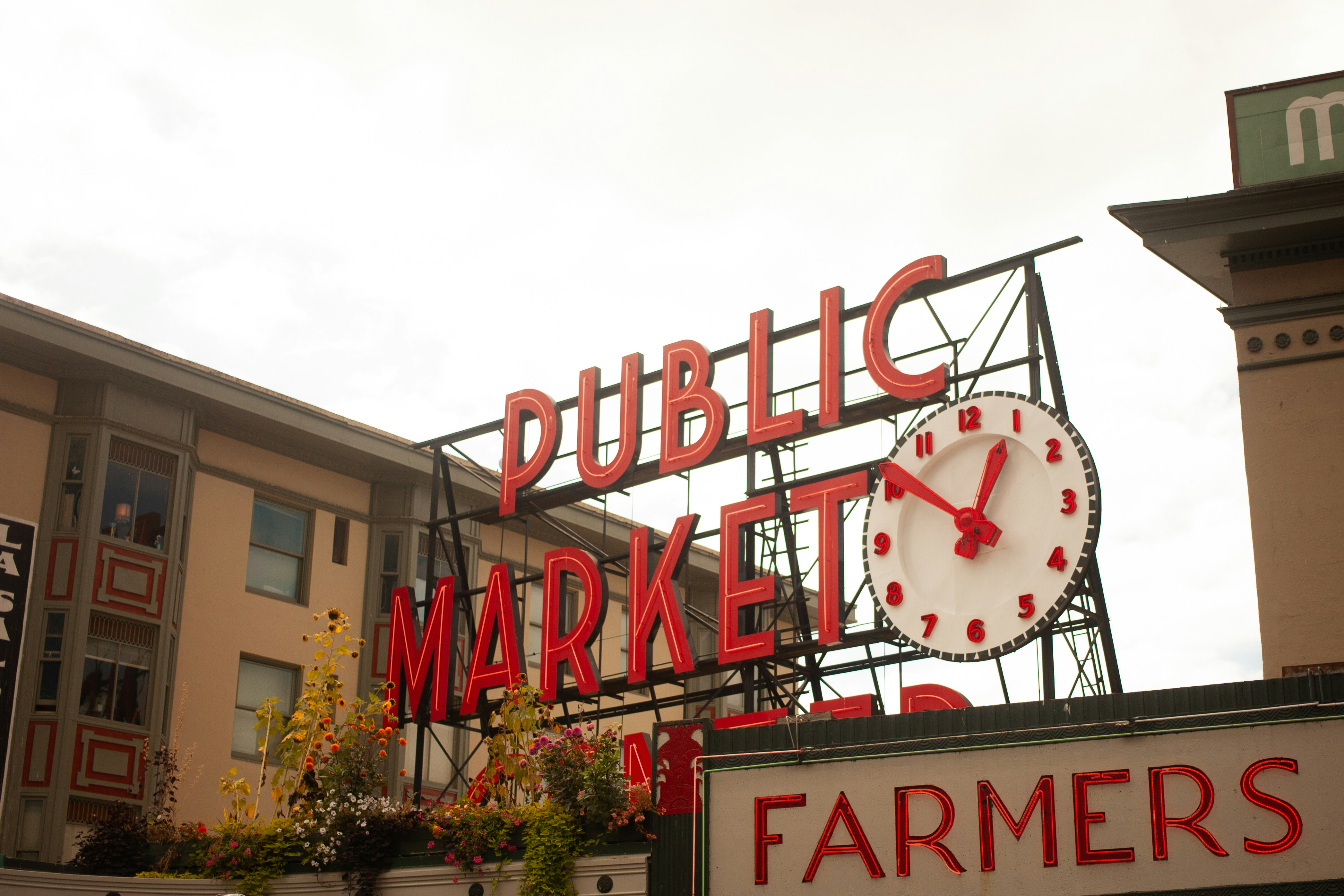A sign for a farmers market with a clock photo – Free Seattle Image on ...