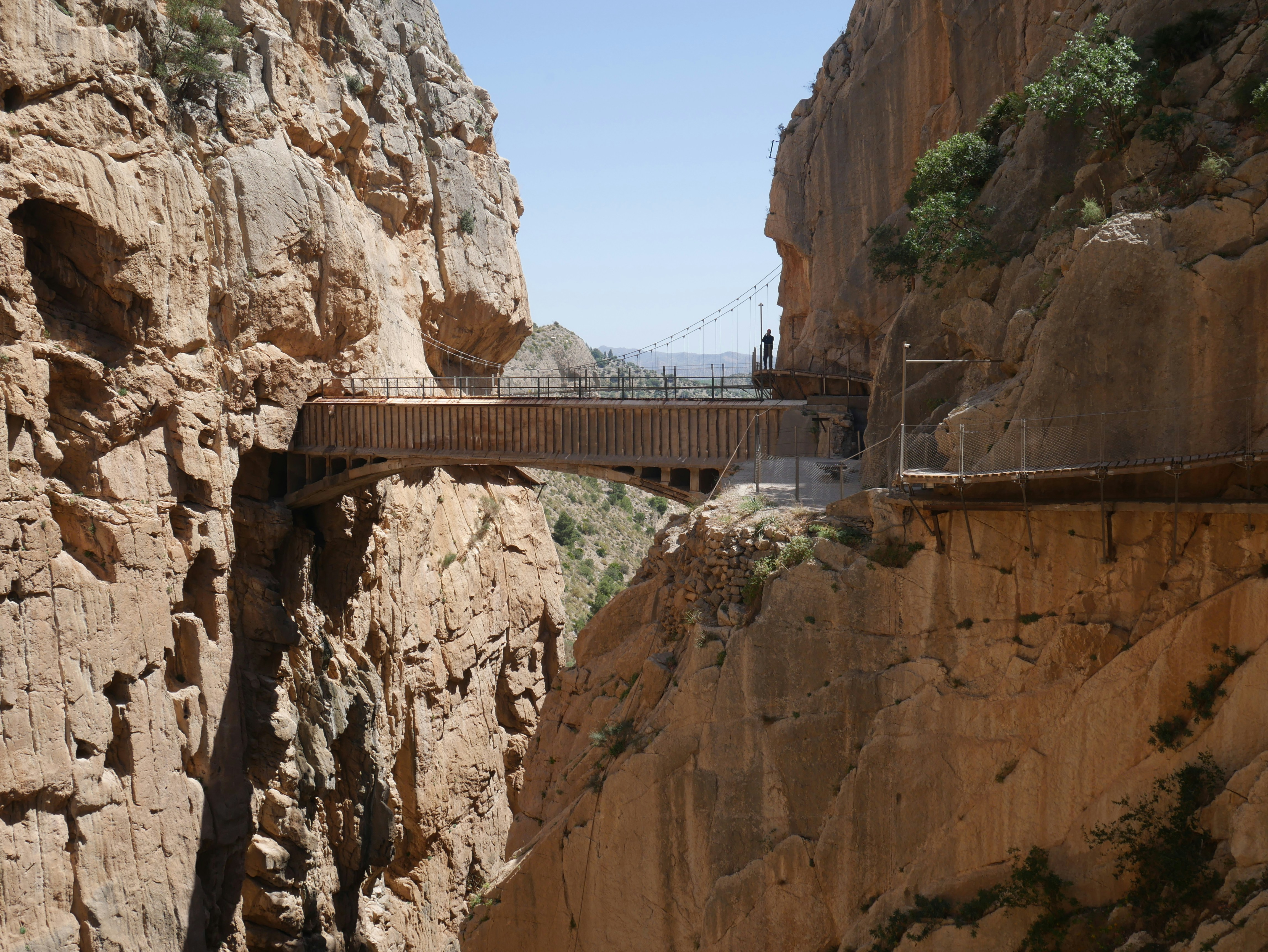 A bridge over a canyon in the mountains photo – Free Ardales Image on ...