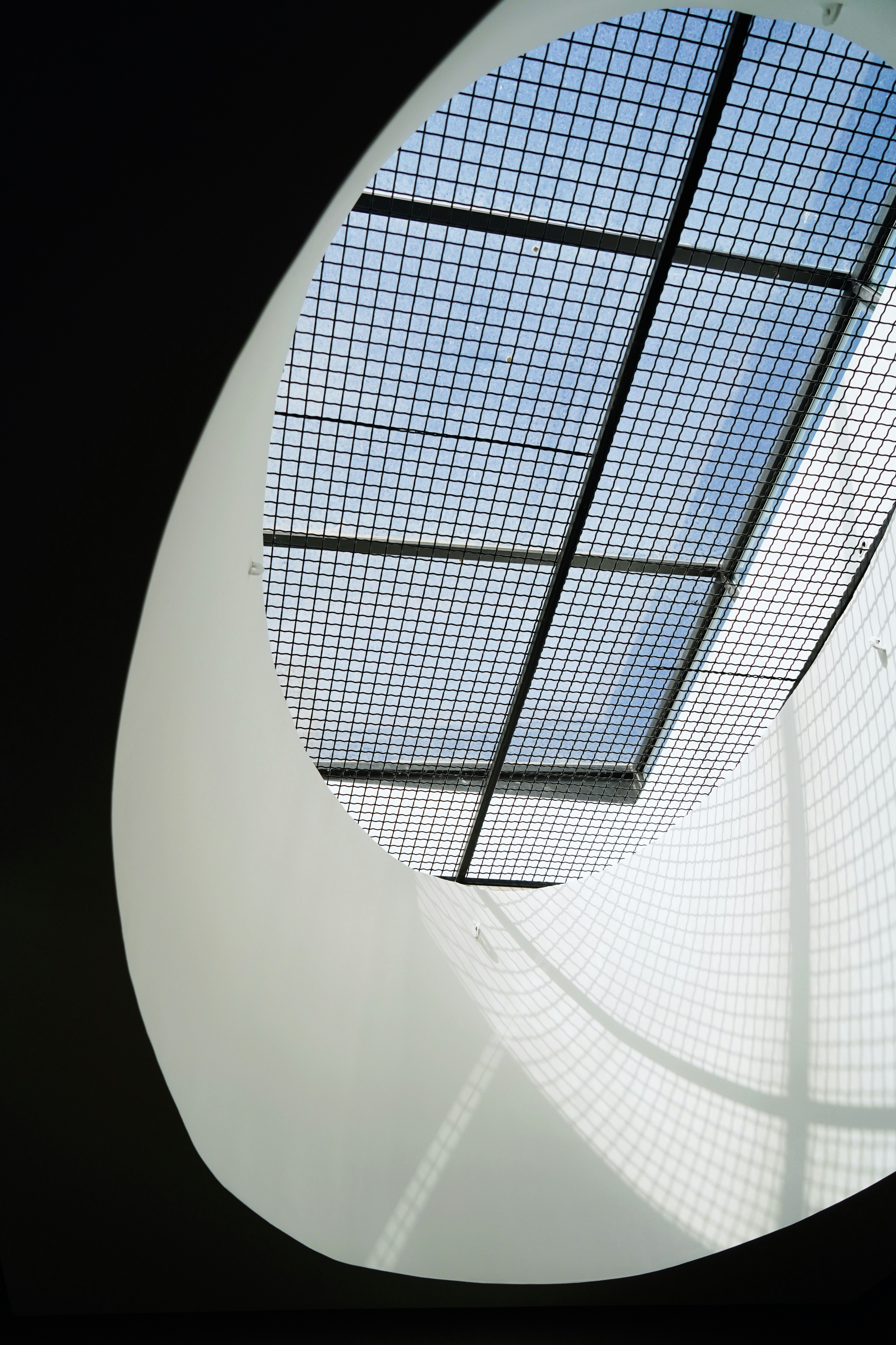 A round window with a skylight above it photo – Free Skylight Image on ...