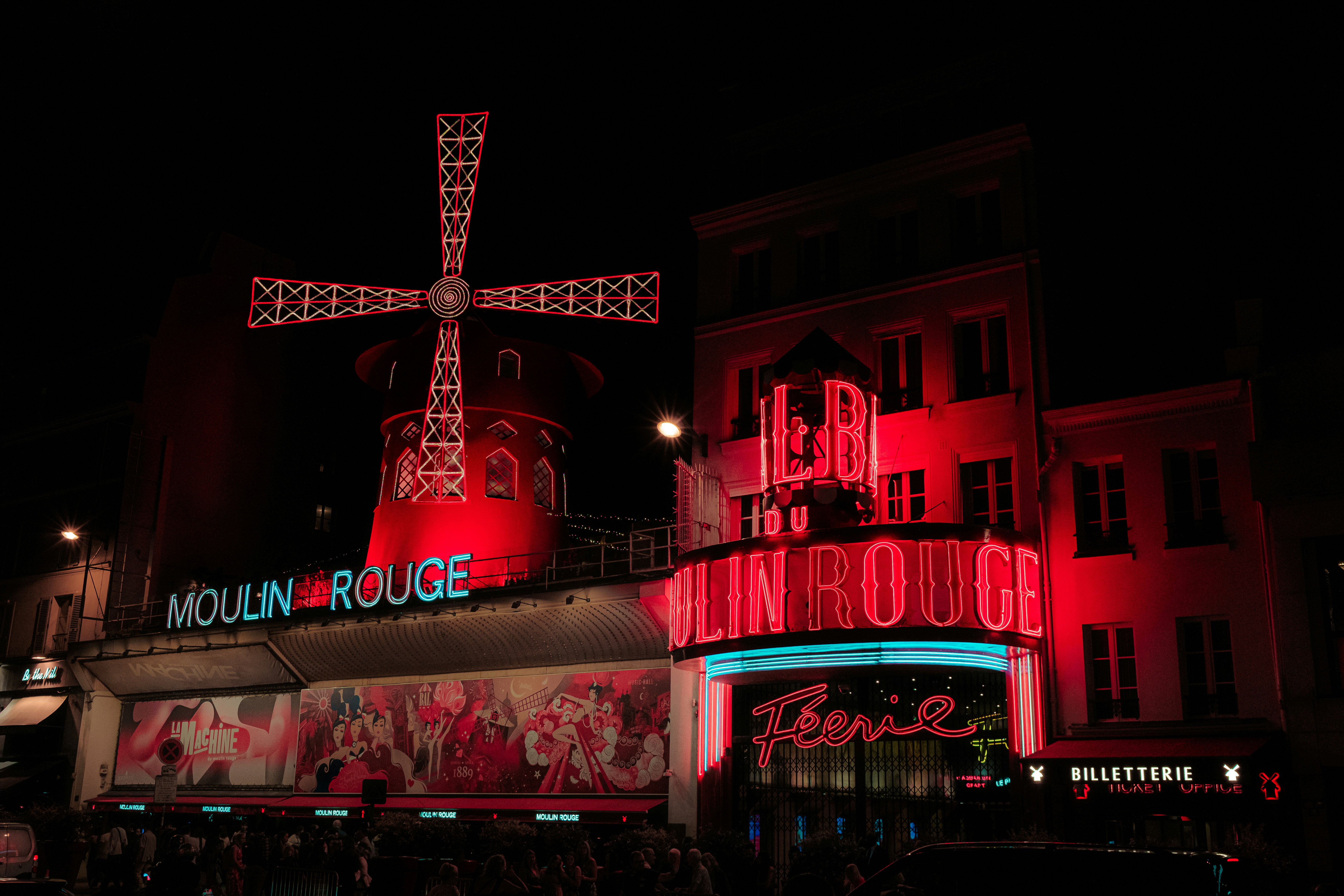 Neon Windmill Glow Over the Moulin Rouge at Night
