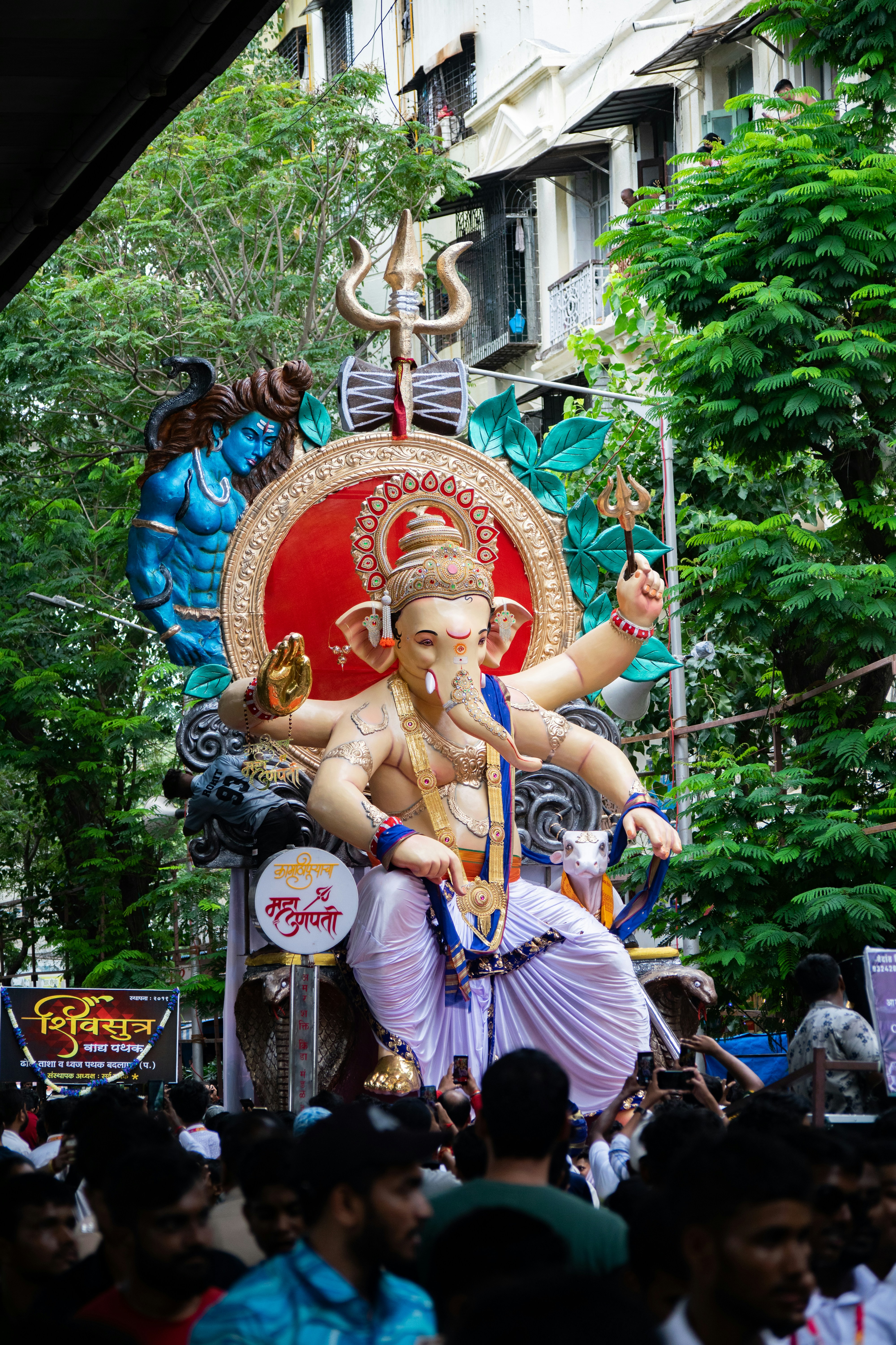 A large statue of a hindu god on a float photo – Free Mumbai Image on ...