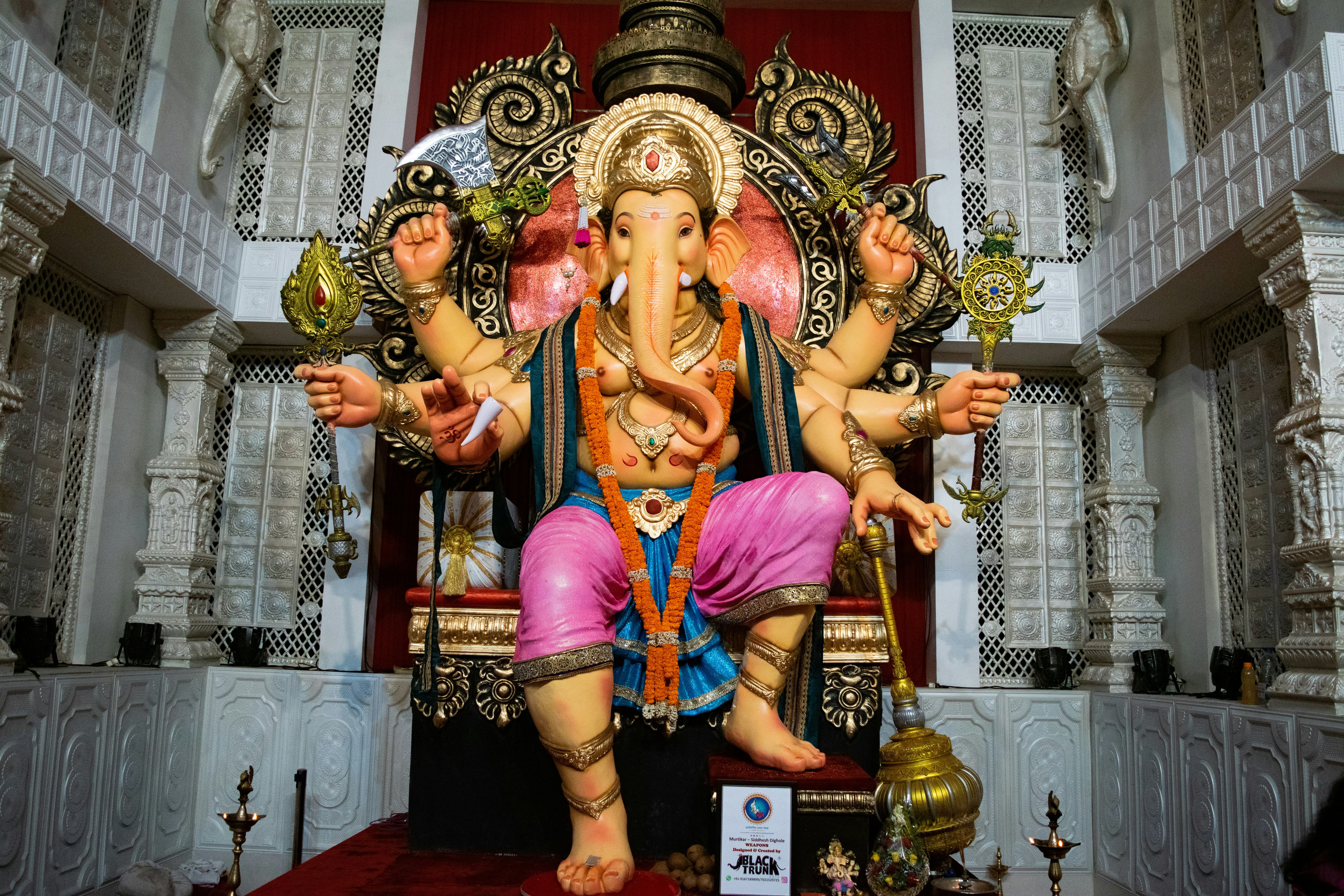 A statue of a ganesh sitting on a chair photo – Free Full hd wallpaper ...