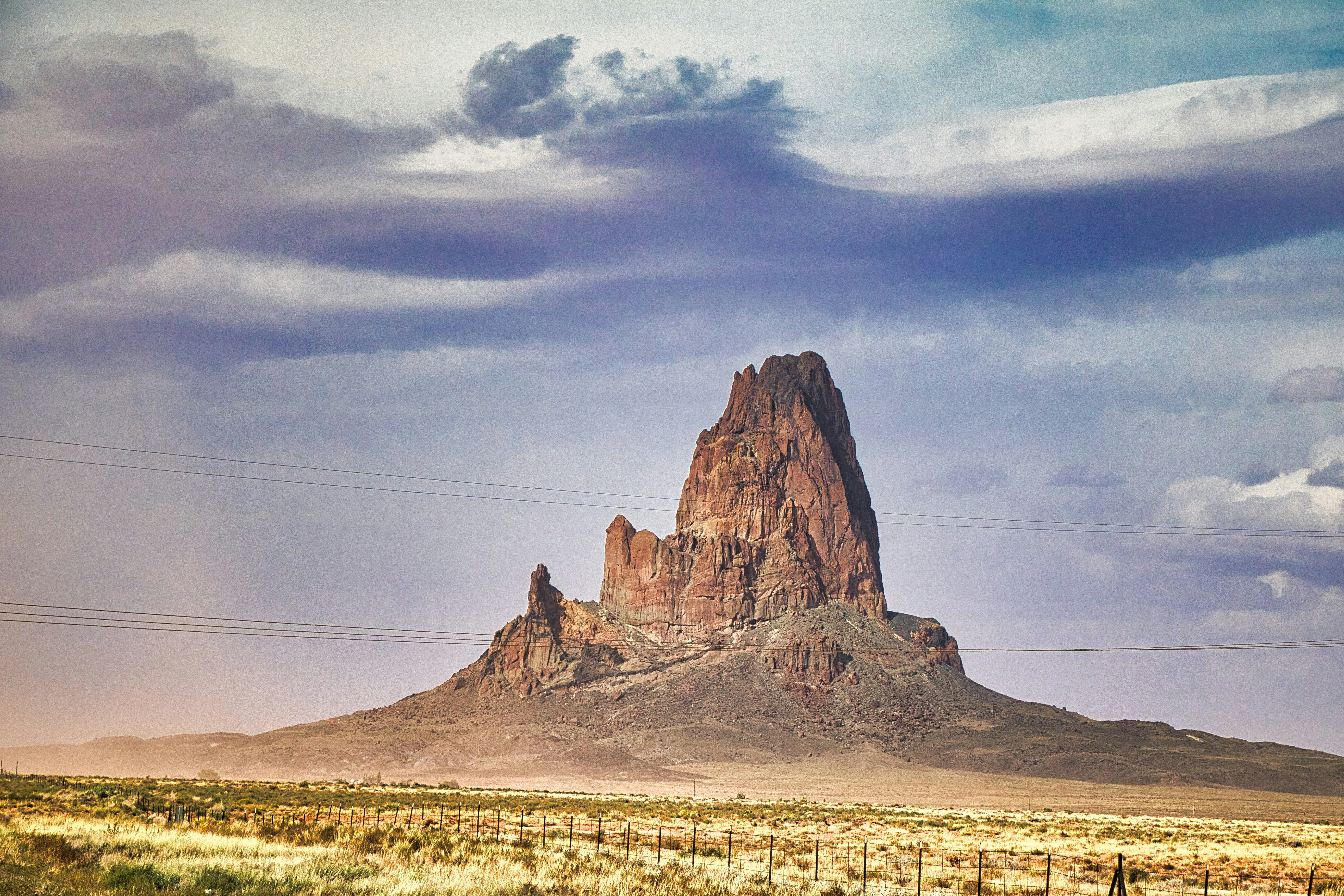 Desert Monument: A Lone Peak Rising from Low Plain