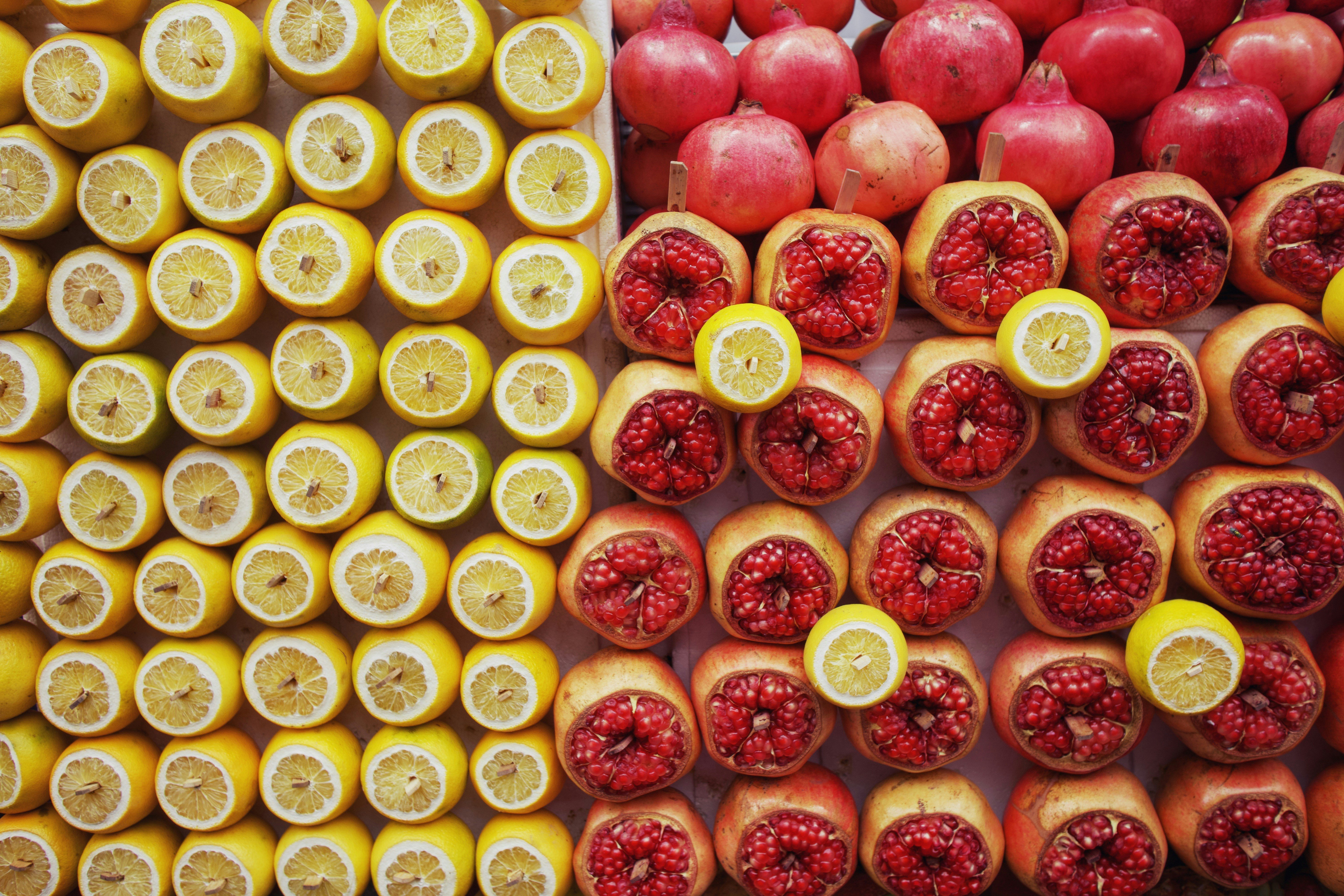 Citrus Meets Pomegranate Grid: A Split-Display of Lemons and Pomegranates
