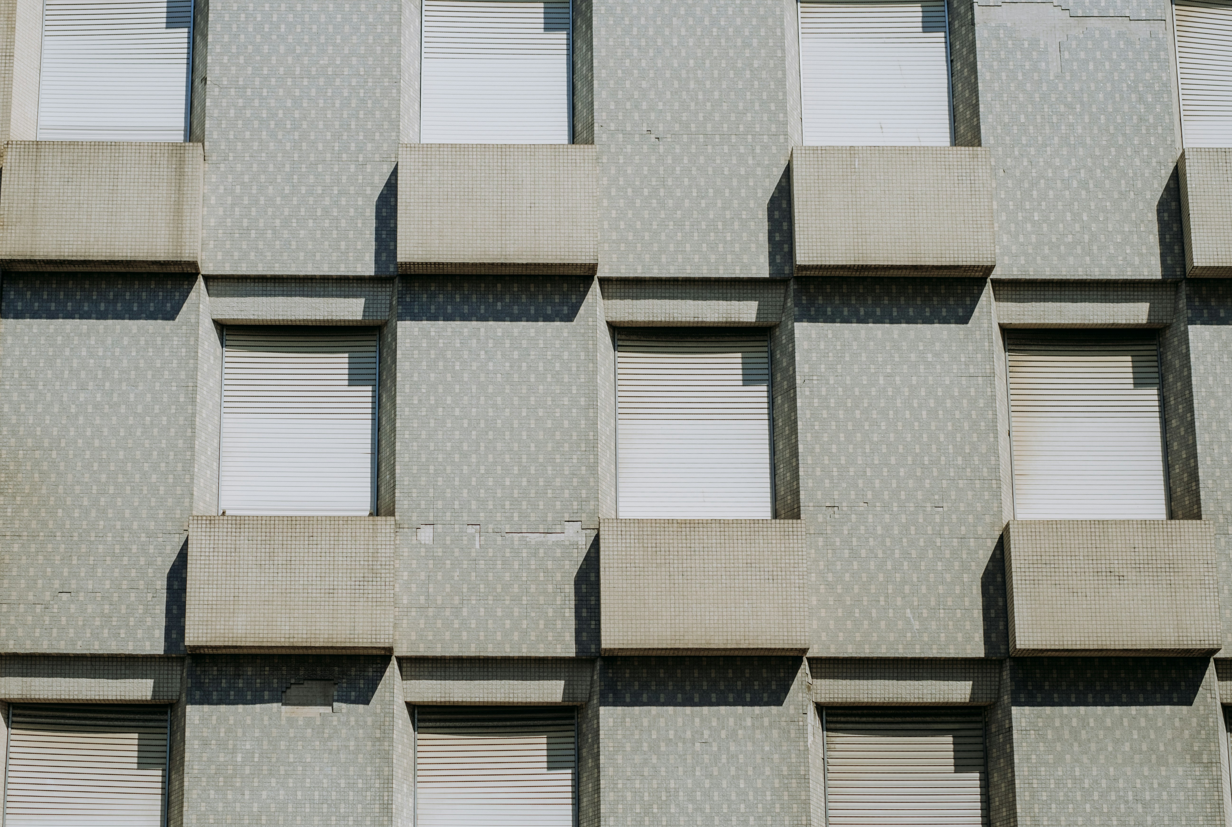 A very tall building with many windows and shutters photo – Free Porto ...