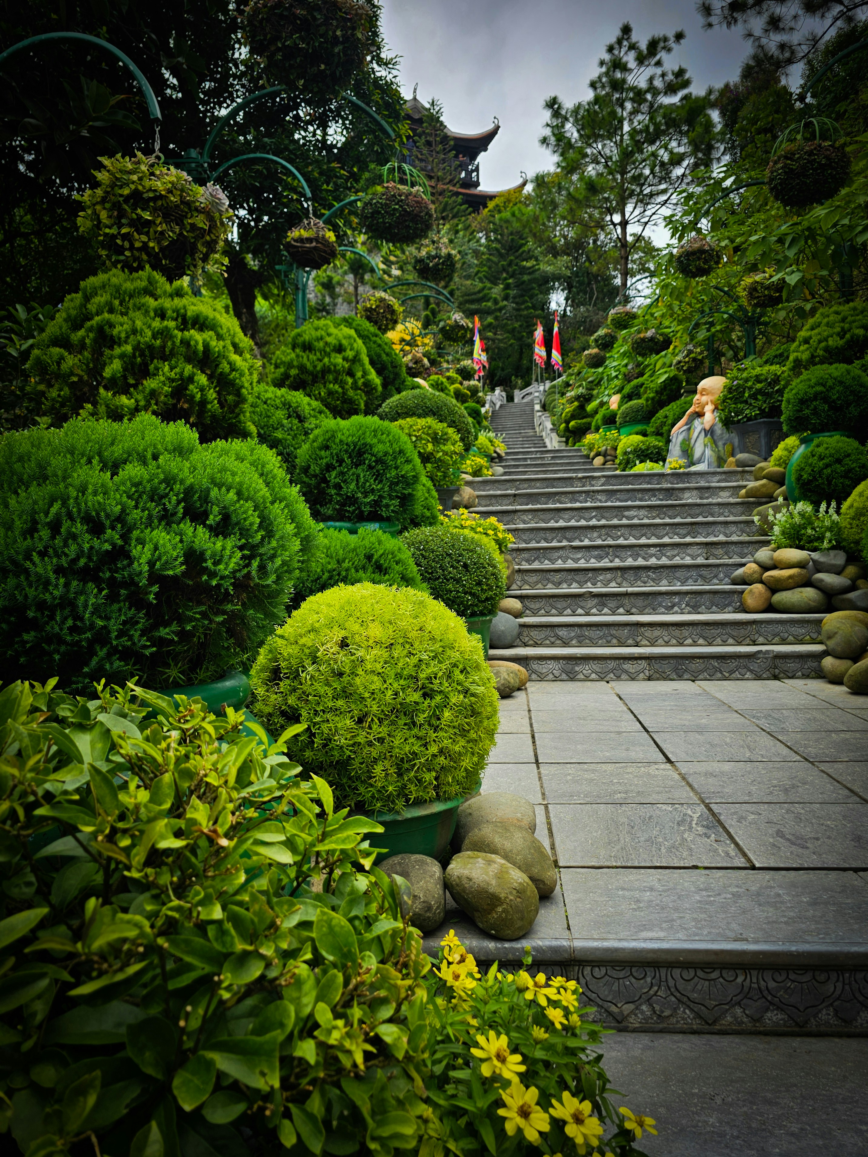 Path to the Pagoda: Staircase through a Garden of Round Topiary