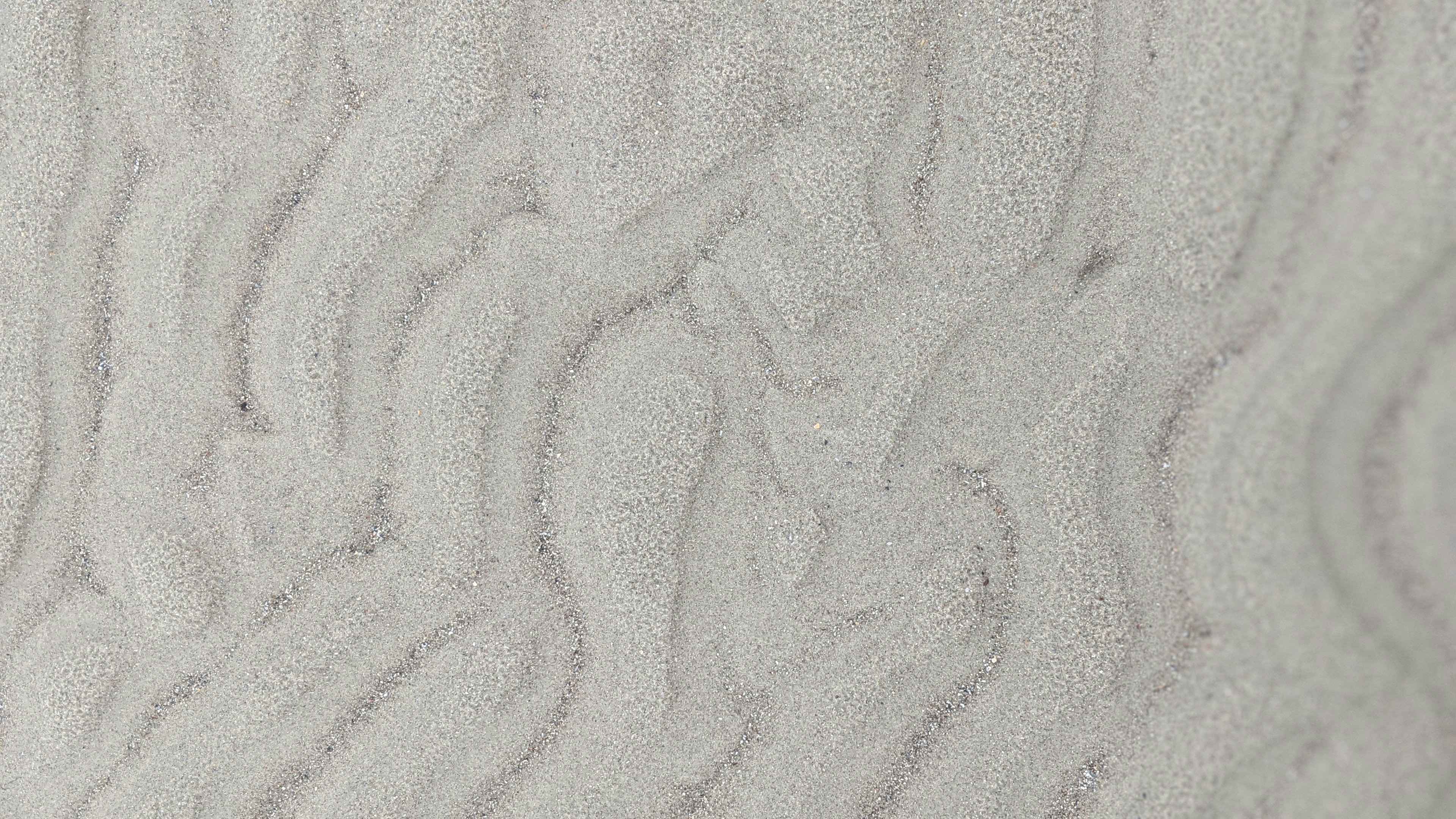 A close up view of sand and water photo – Free Sand art Image on Unsplash