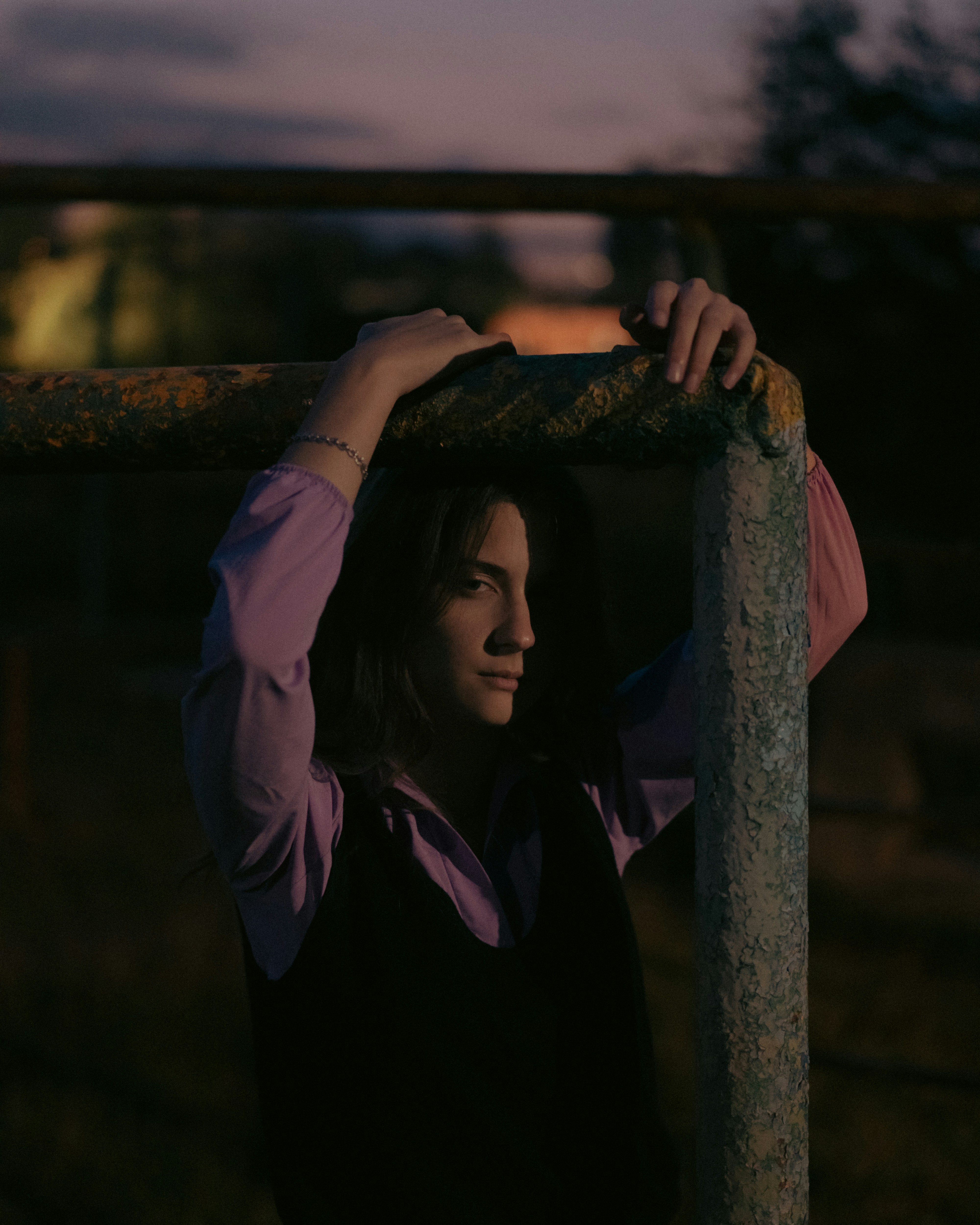Twilight Between Rails: A Quiet Portrait in Rust and Shadow