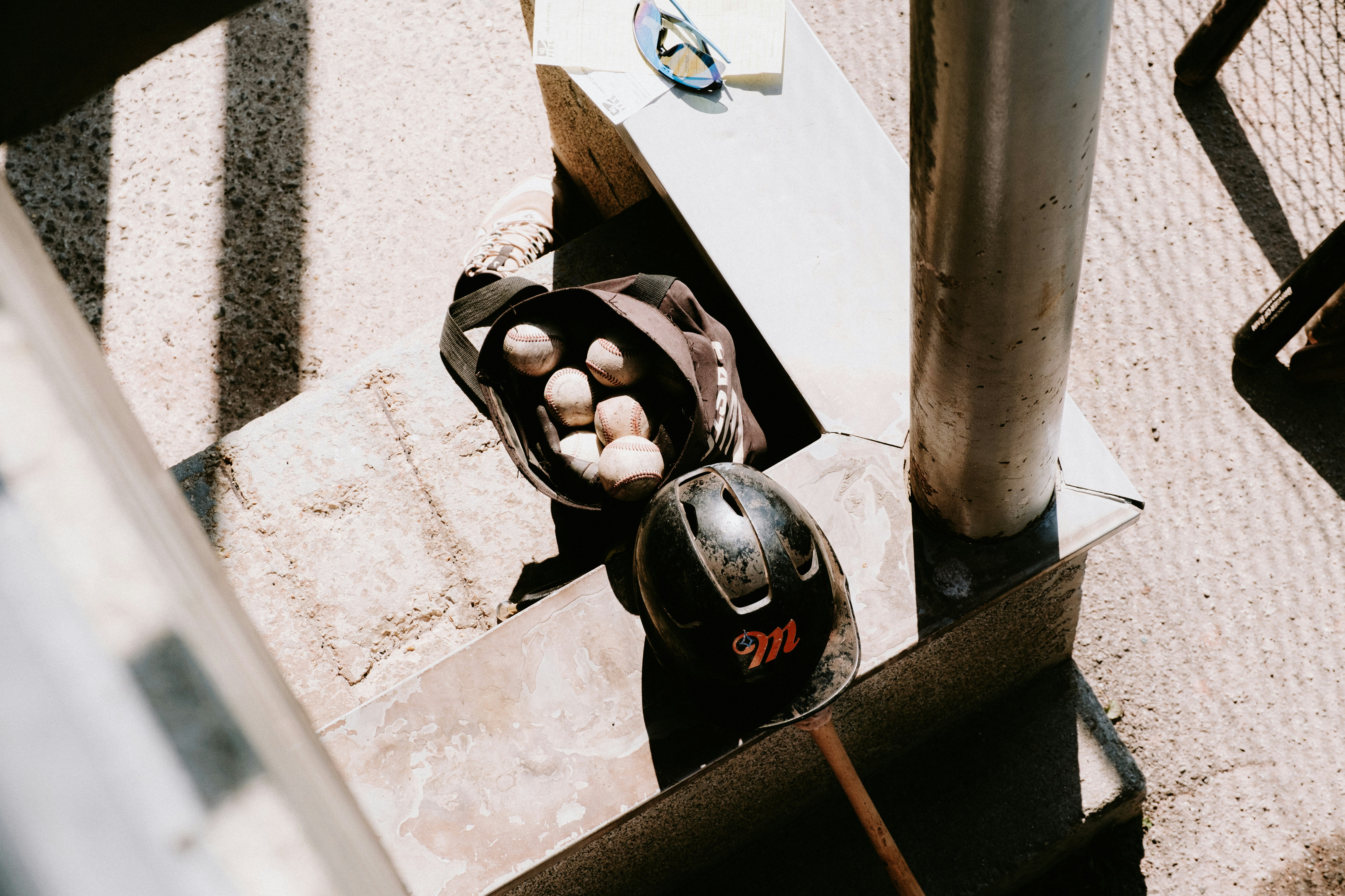 Industrial Corner: Eggs, Helmet, and Shadowed Angles