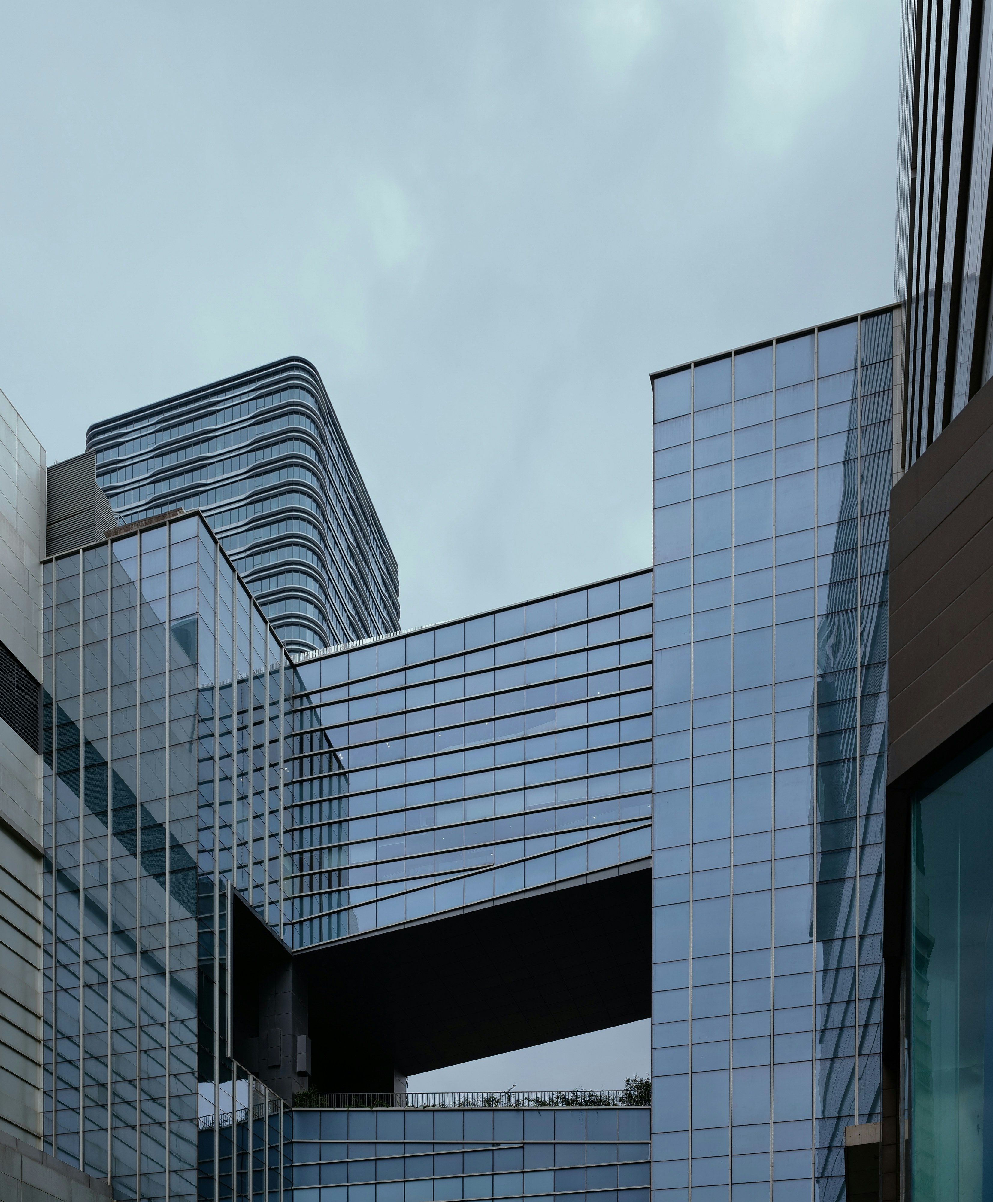 A very tall building with many windows on top of it photo – Free Qufu ...