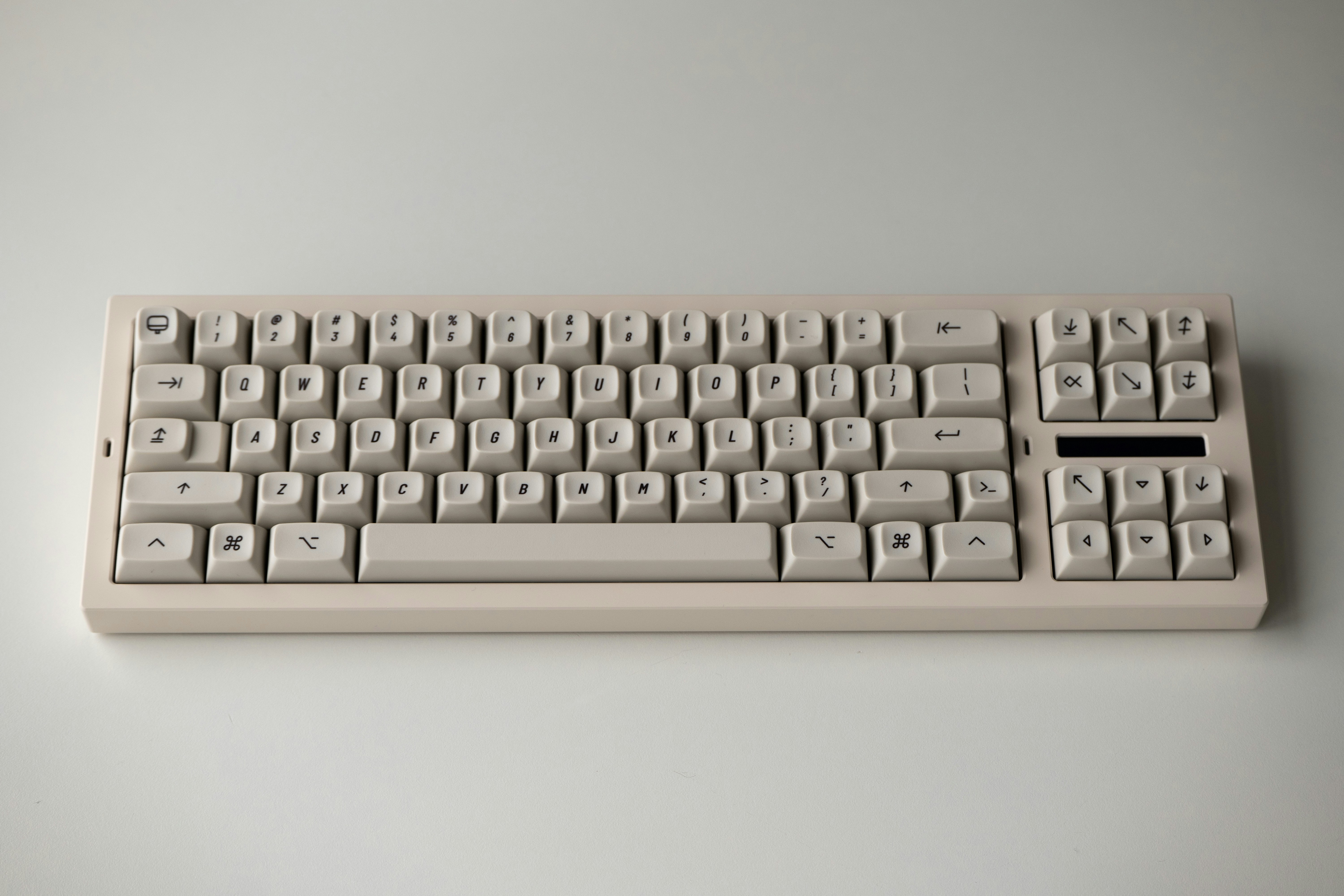 A computer keyboard sitting on top of a table photo – Free Tenet 70 ...