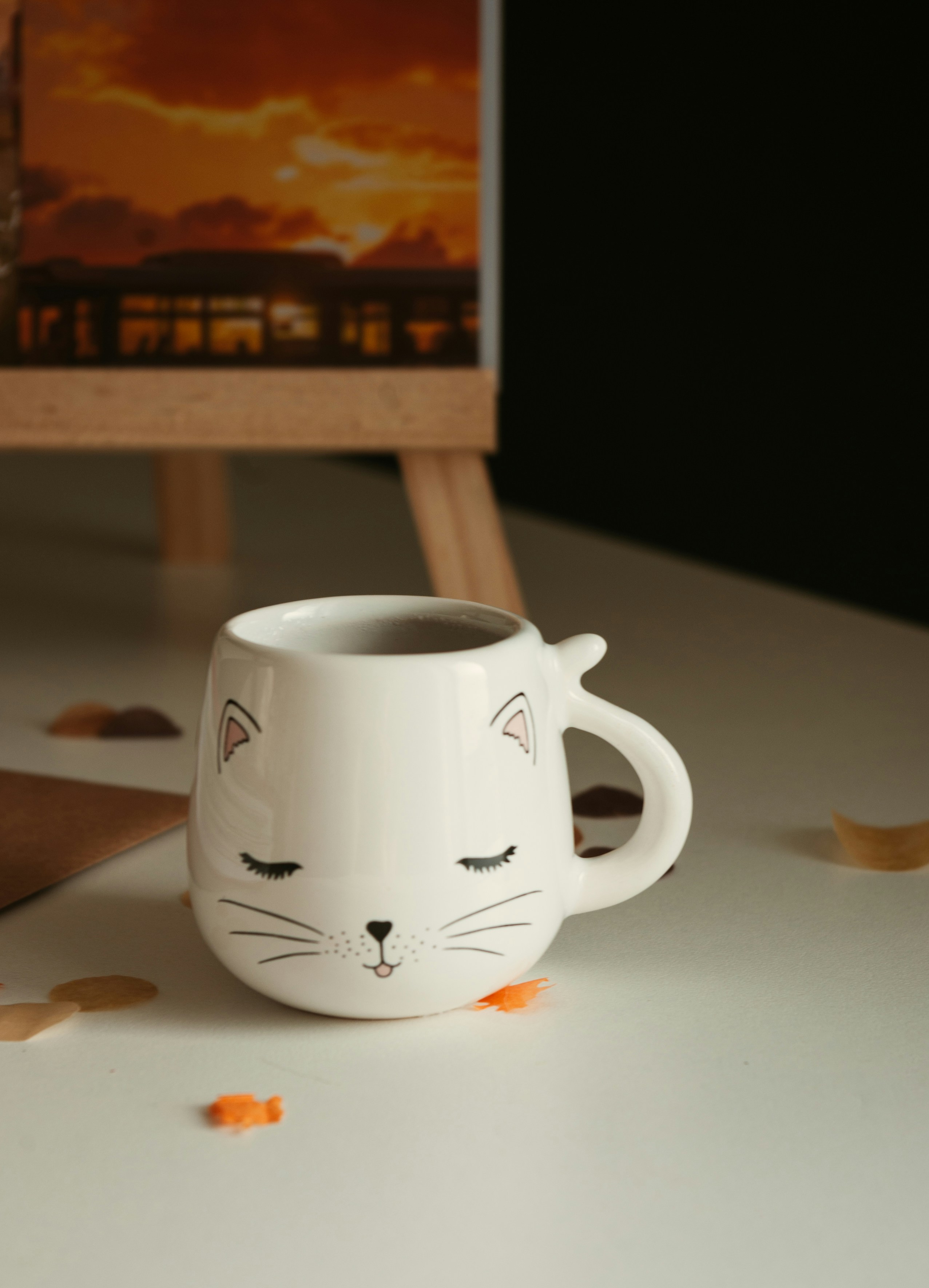 Ceramic Cat Mug Beneath a Sunset Studio