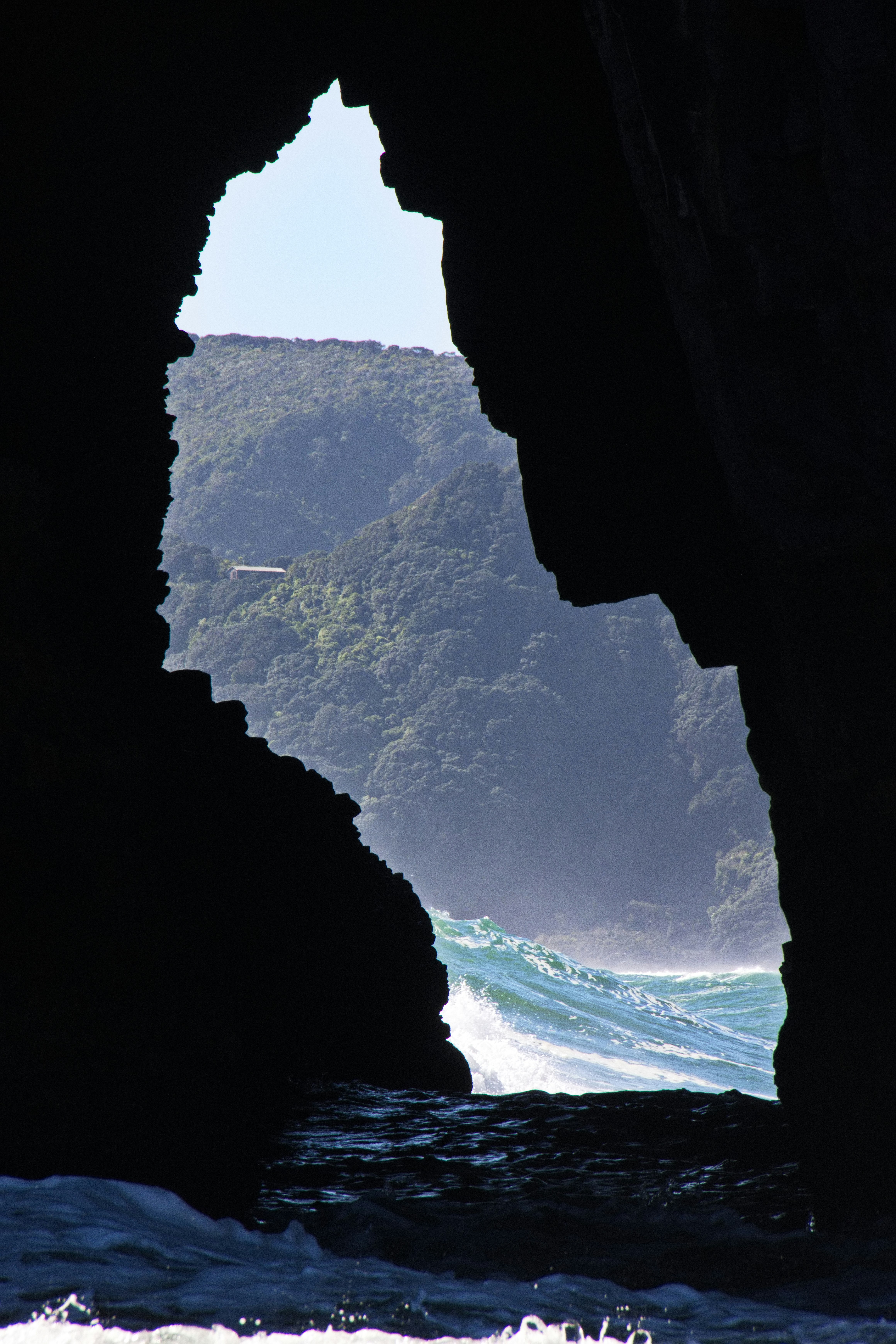 The Key Hole, Piha Beach. Sometimes used by surfers as a shortcut to the back of the incoming surf sets. Not for the faint of heart!