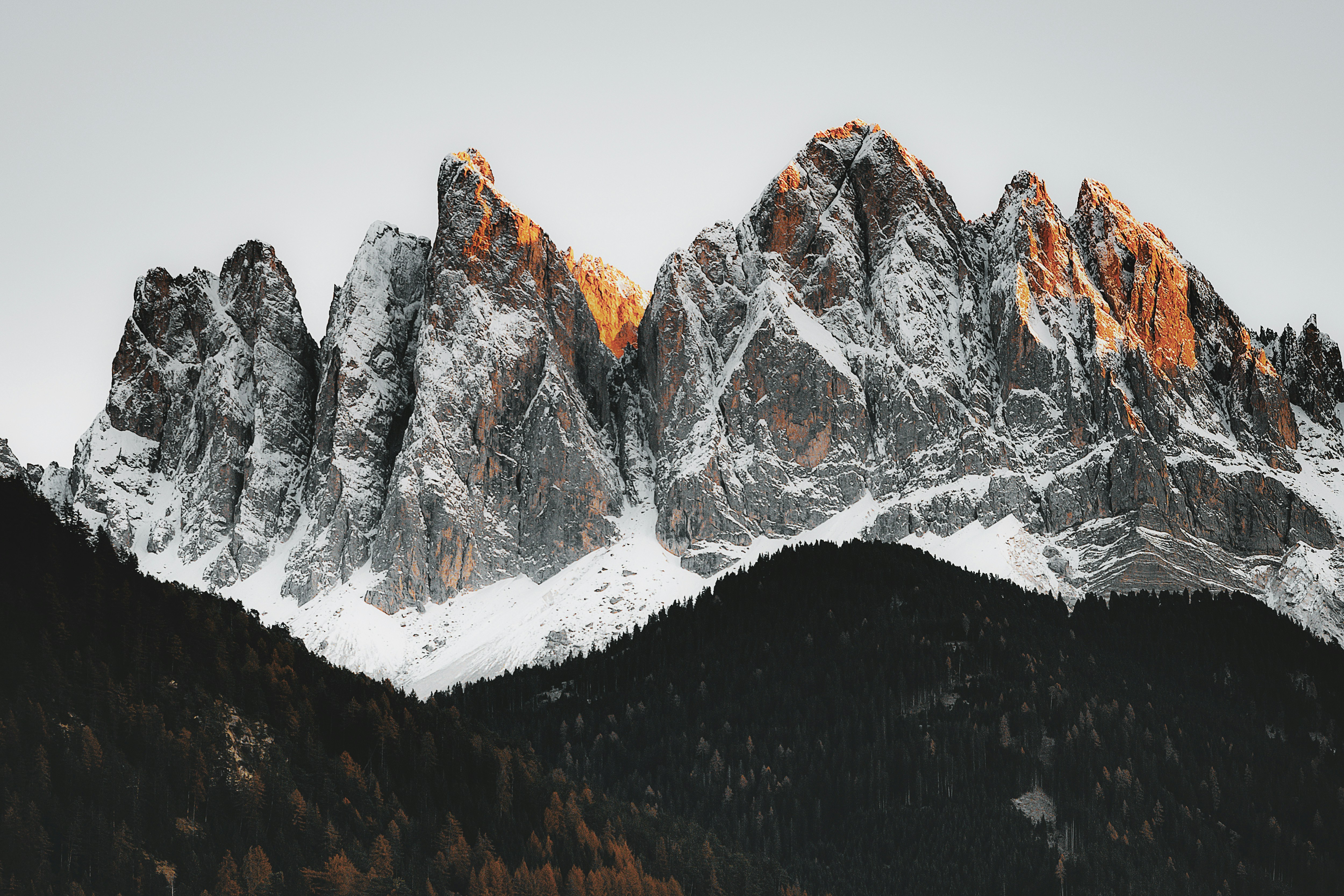 A mountain range covered in snow in the winter photo – Free Nature ...