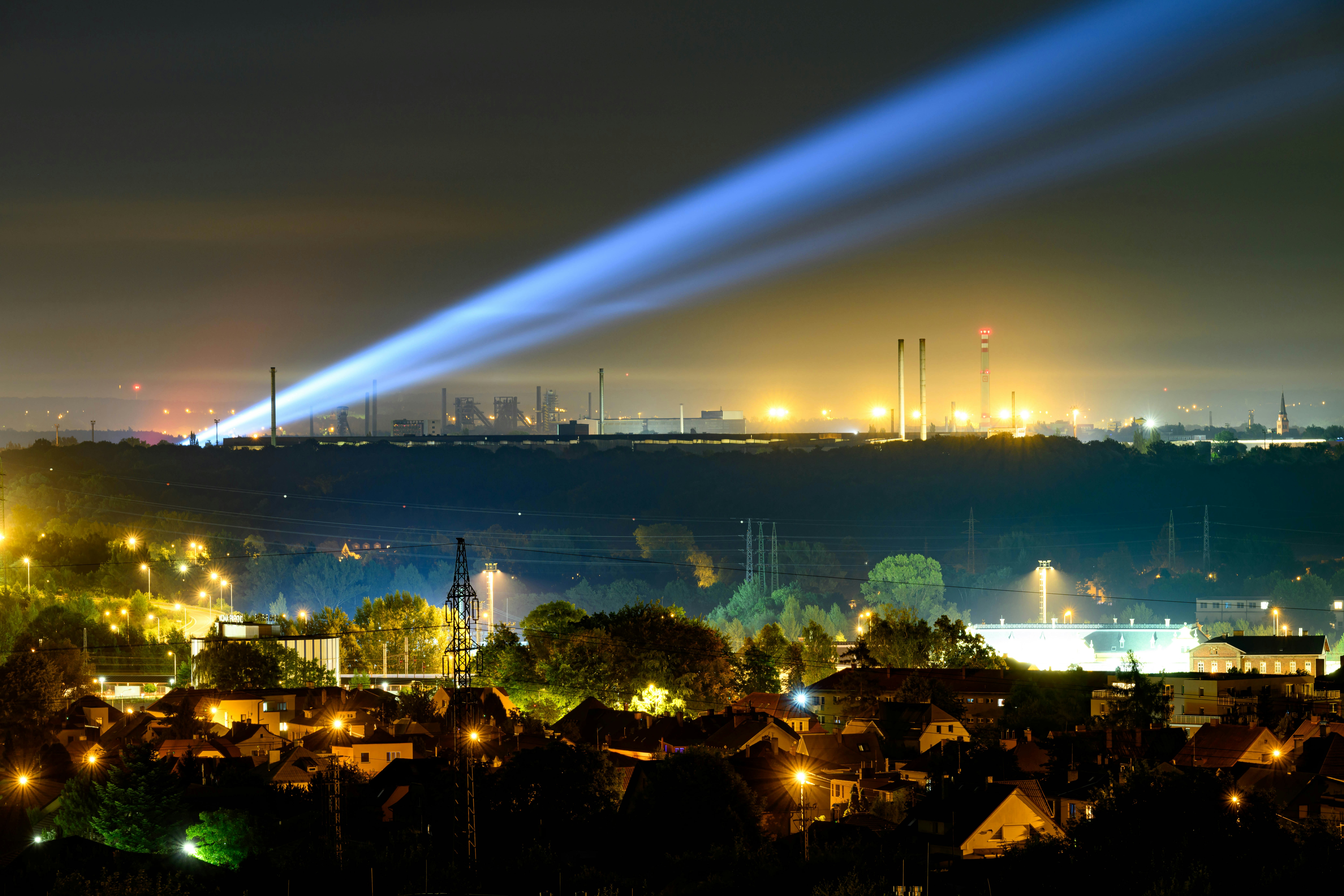 a view of a city at night from a distance