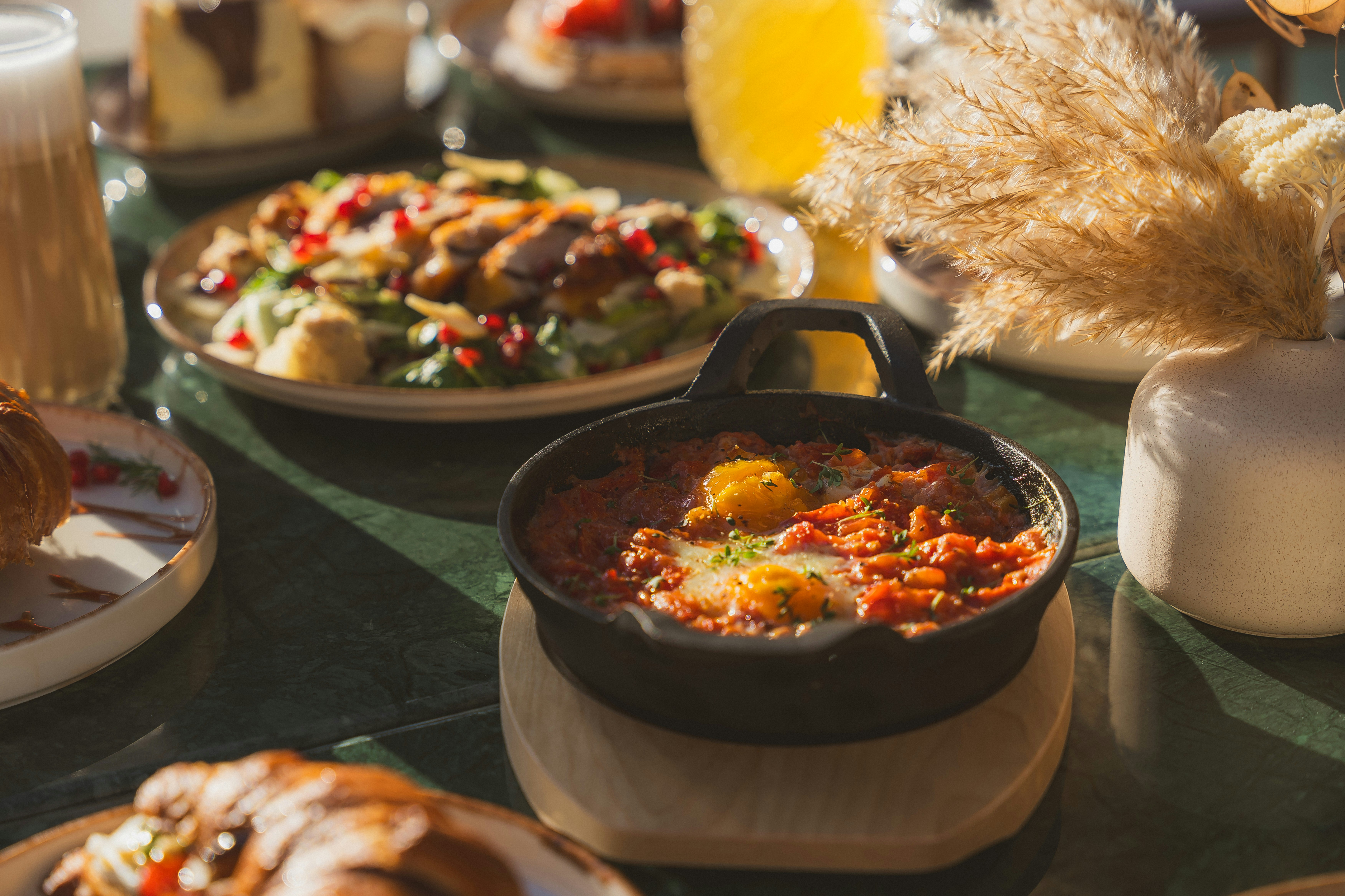 A table topped with lots of different types of food photo – Free Brunch ...