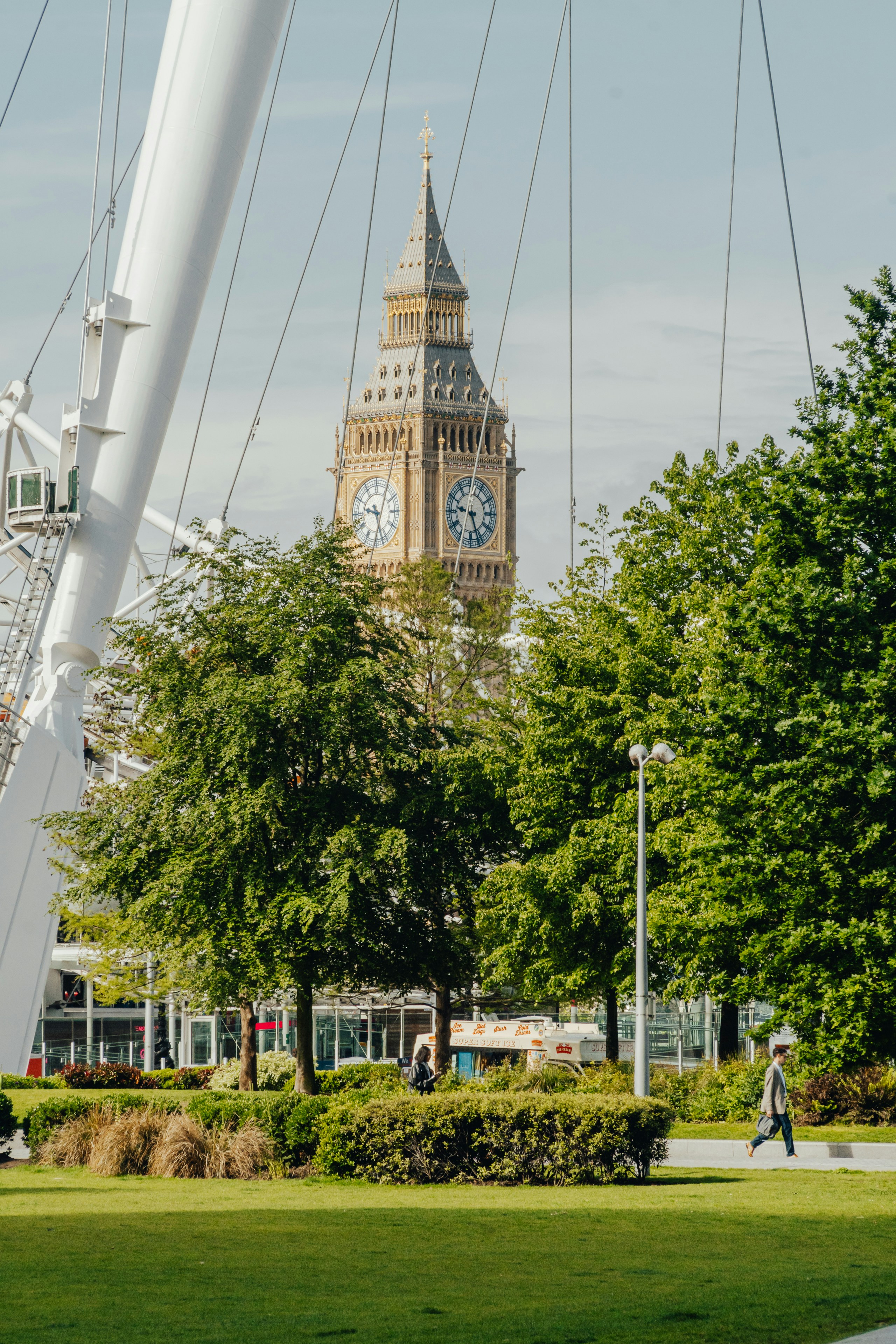 Elizabeth Tower Peeks Through London's Green Canopy with a Glimpse of the London Eye