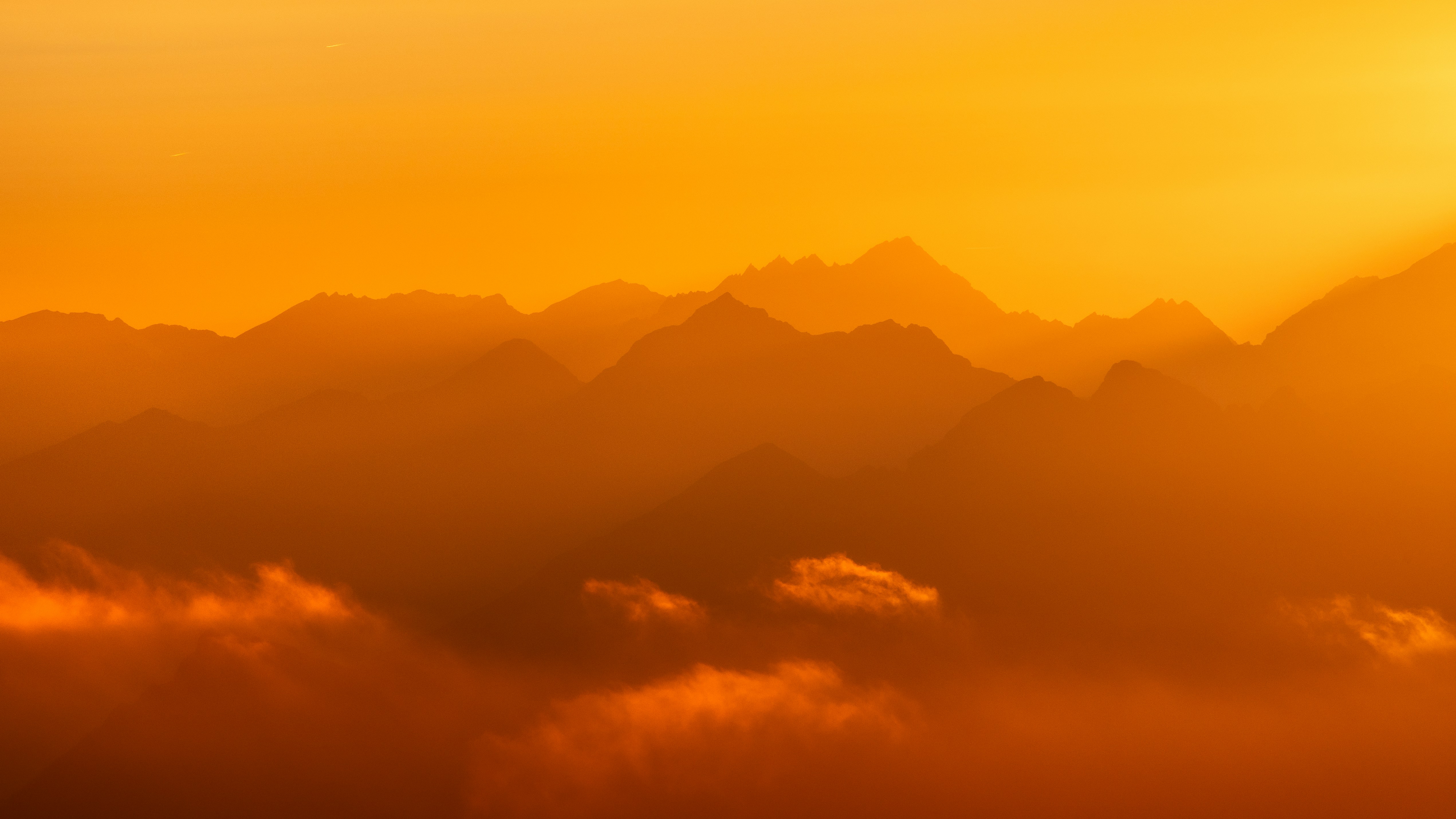 The sun is setting over the mountains in the sky photo – Free Nature ...