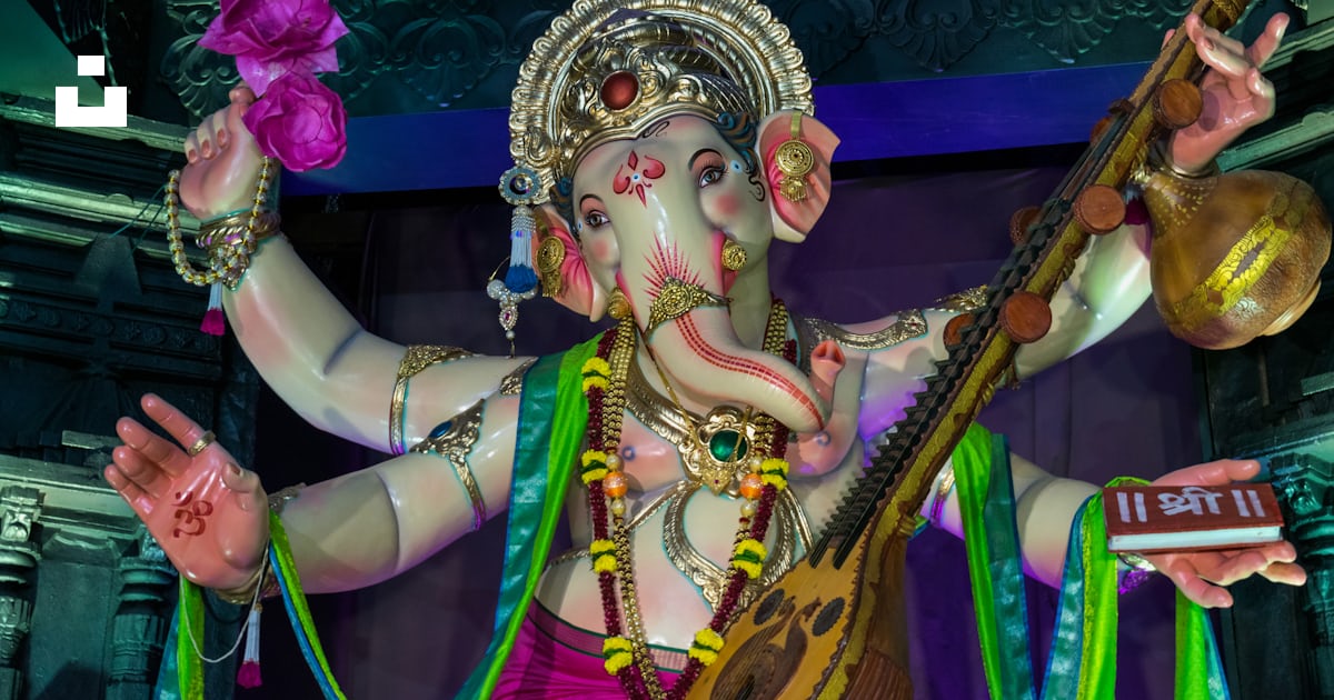 楽器を持つインドの神の像の写真 Unsplashのムンバイの無料画像