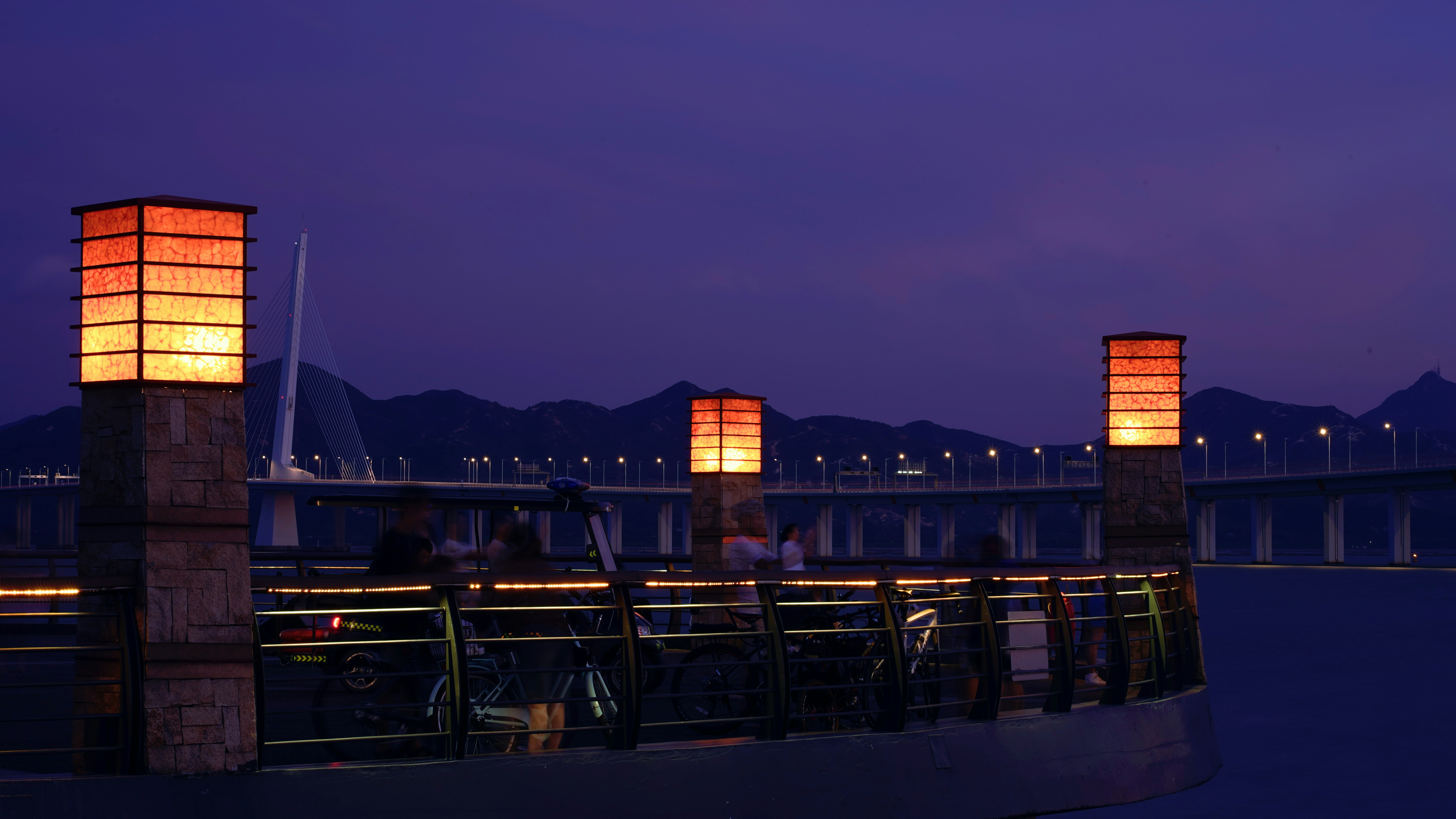 Lantern Pillars at Dusk: A Quiet Pier Under a Violet Sky