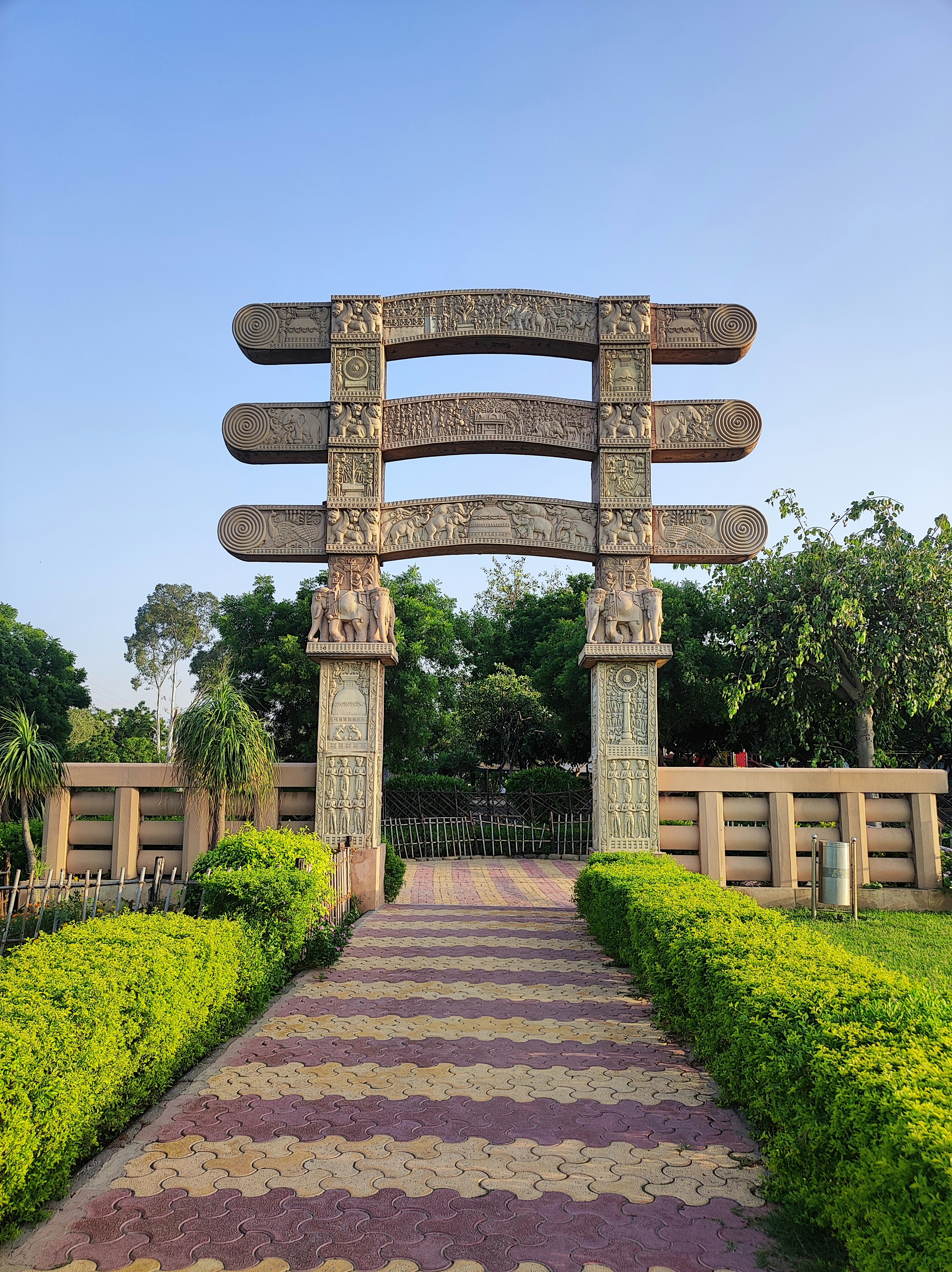 Stone Gateway Amid a Sunny Garden Path