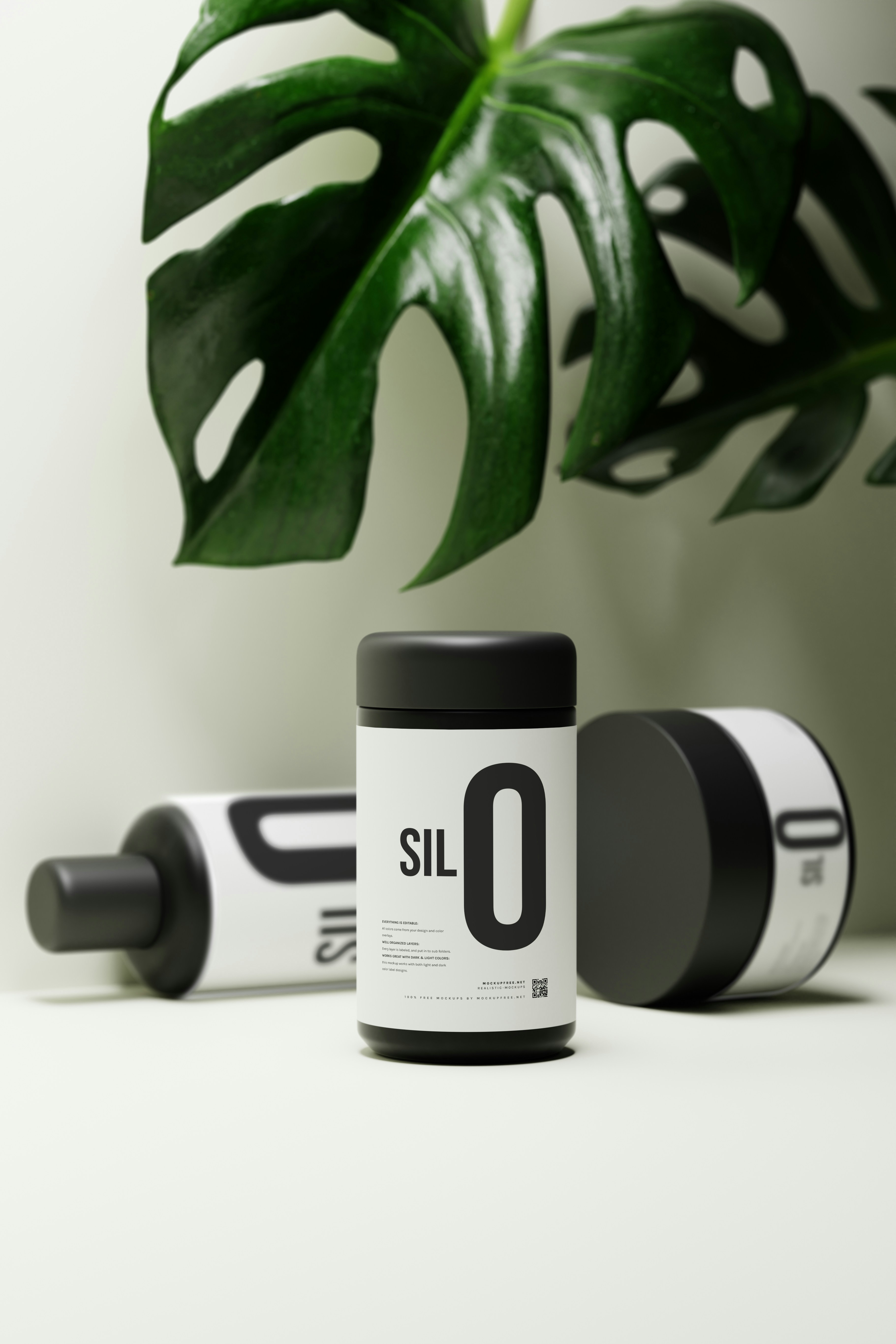 A bottle of sil 0 on a table next to a plant photo – Free Design Image ...