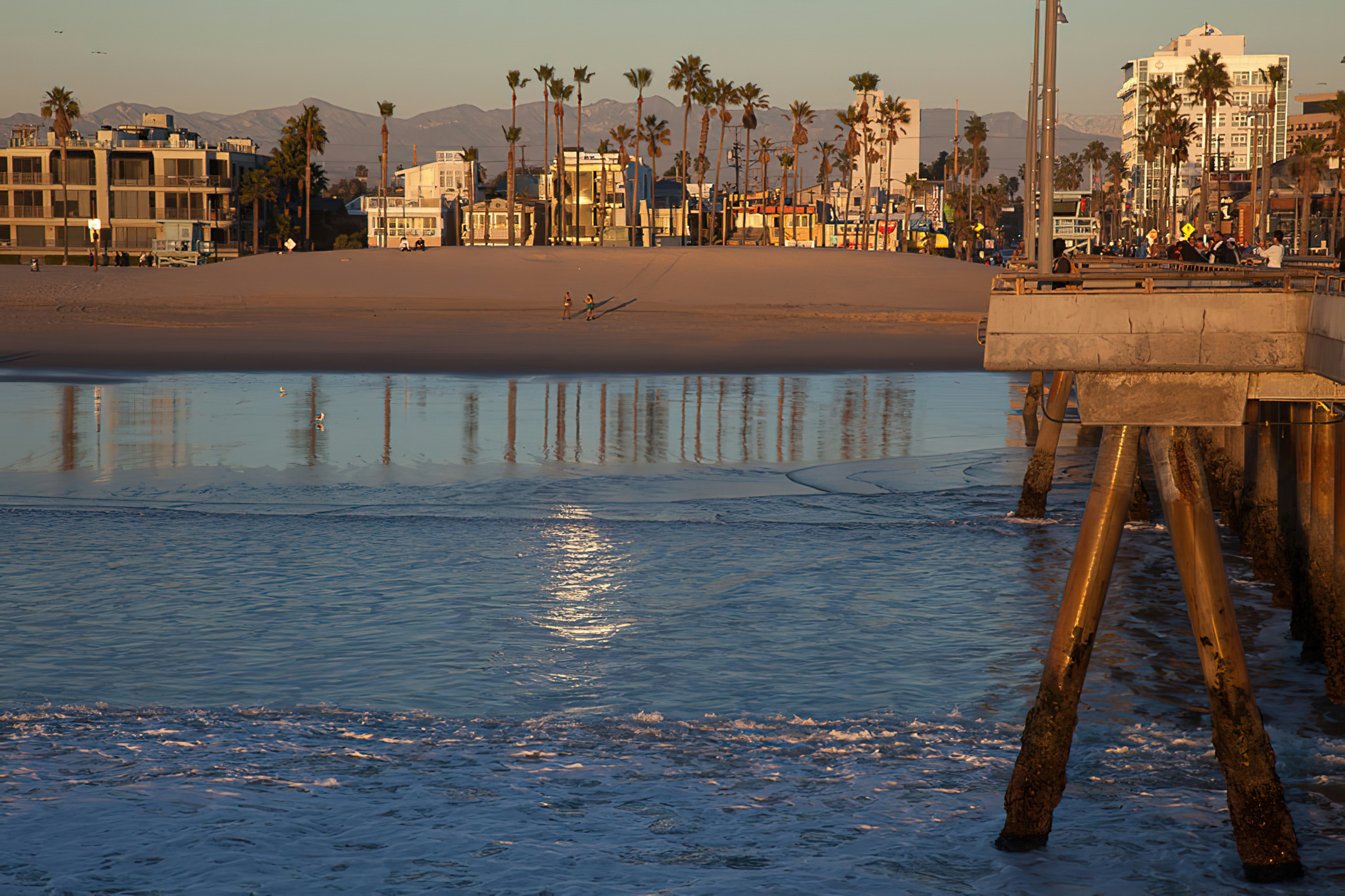 Dawn on the Pier: Quiet Beachfront Glow
