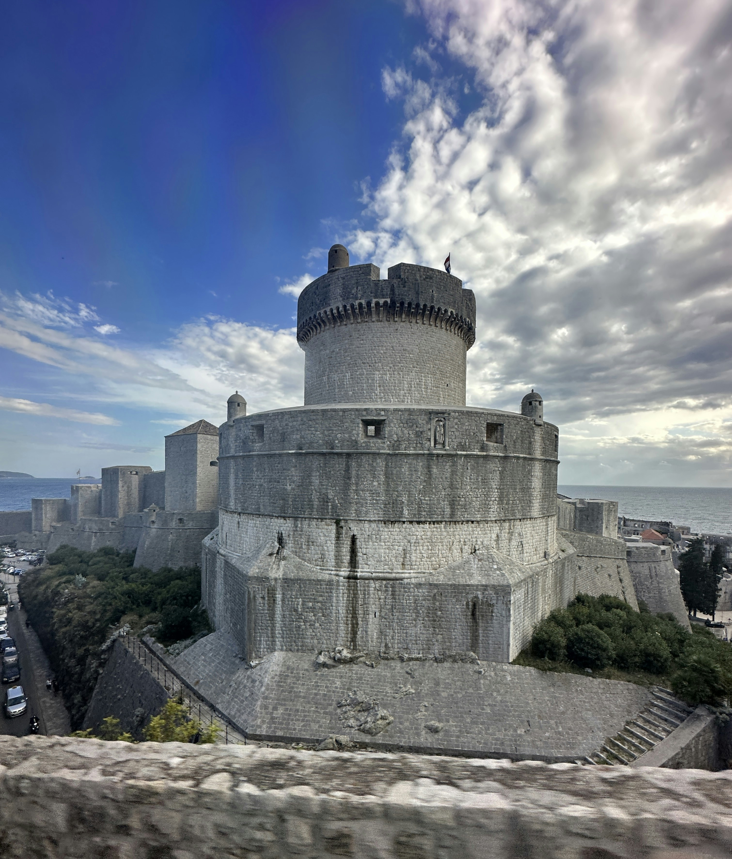A very tall castle sitting on top of a hill photo – Free Fortress Image ...