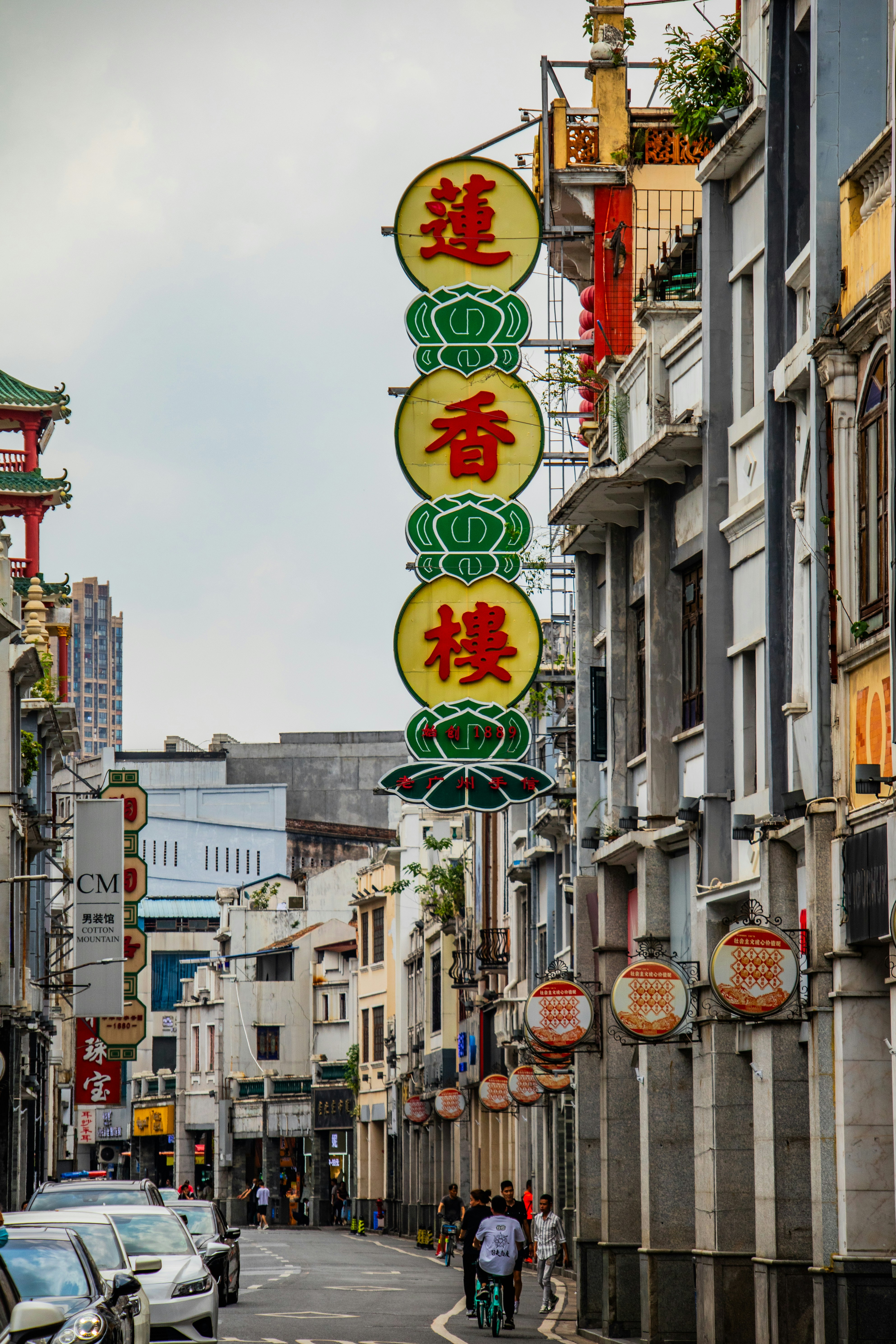A city street with a lot of signs on it photo – Free Guangzhou Image on ...