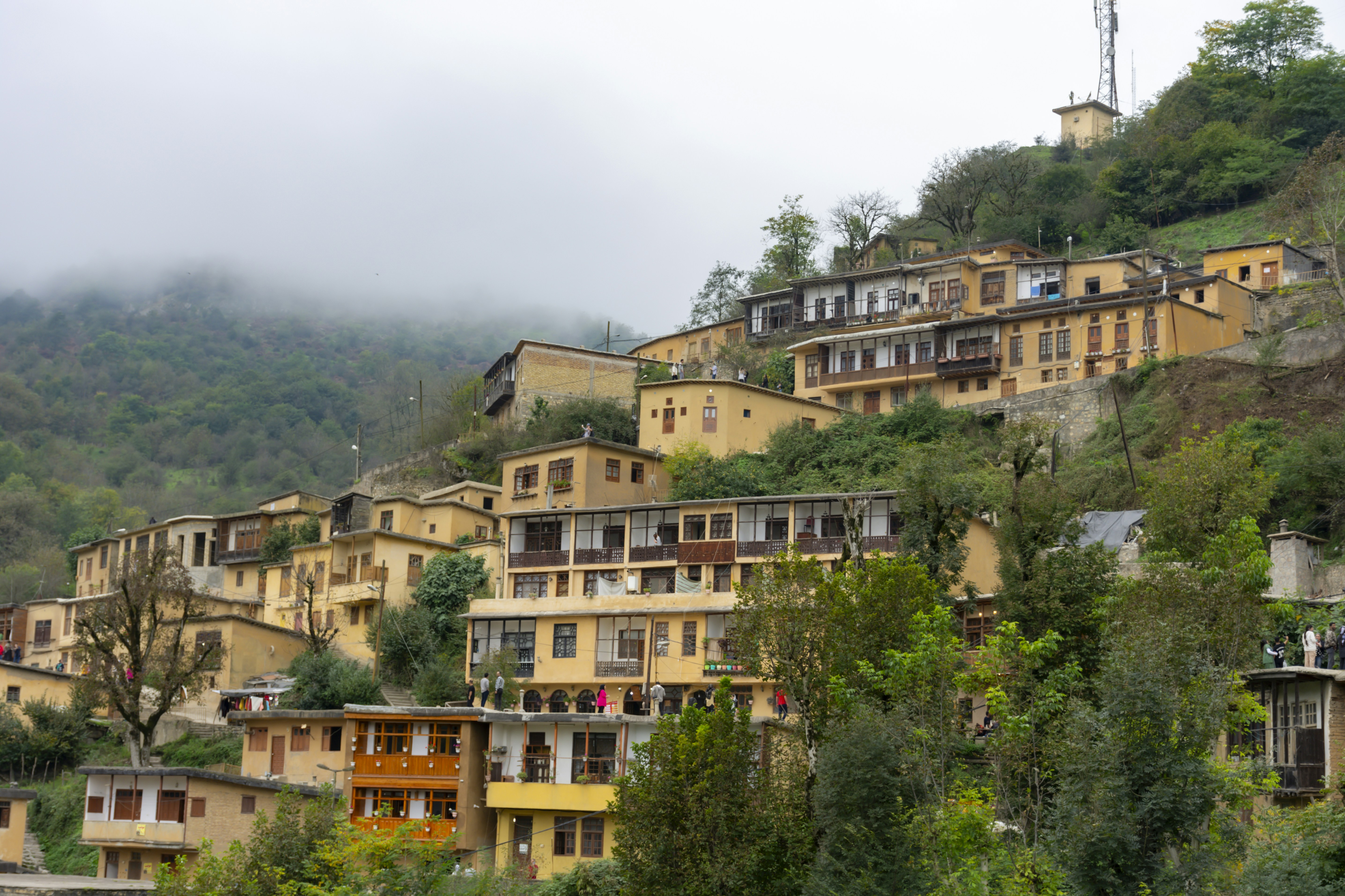 A hillside with a bunch of houses on it photo – Free Masuleh Image on ...