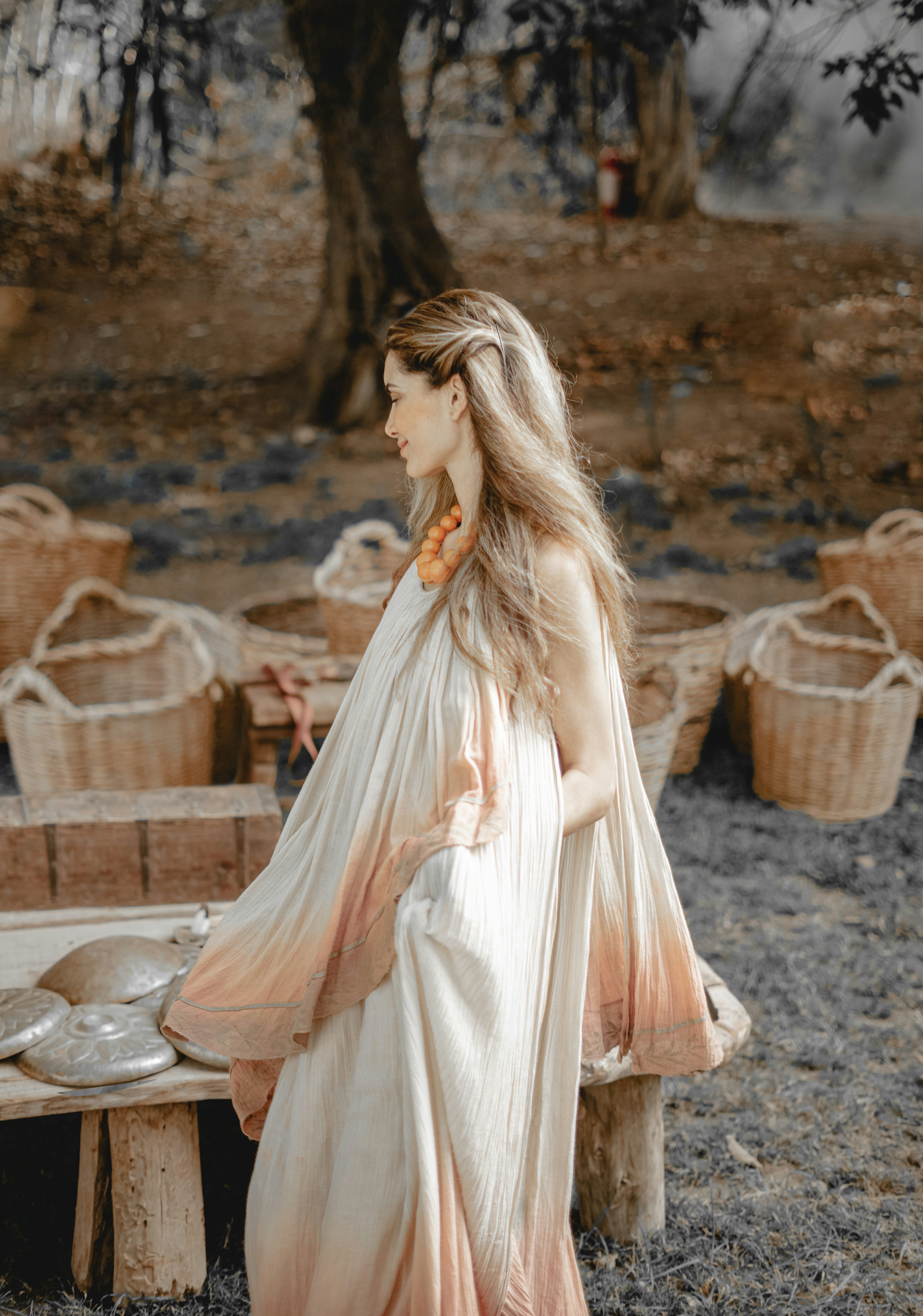 Peach Silk in a Rustic Market: Portrait Among Woven Baskets